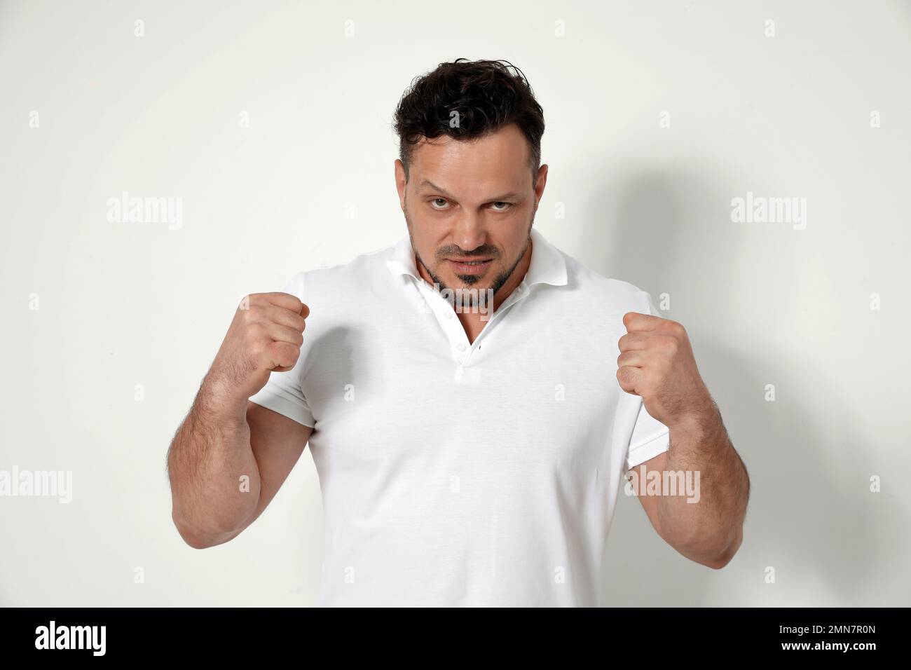 Portrait of emotional man on white background Stock Photo - Alamy