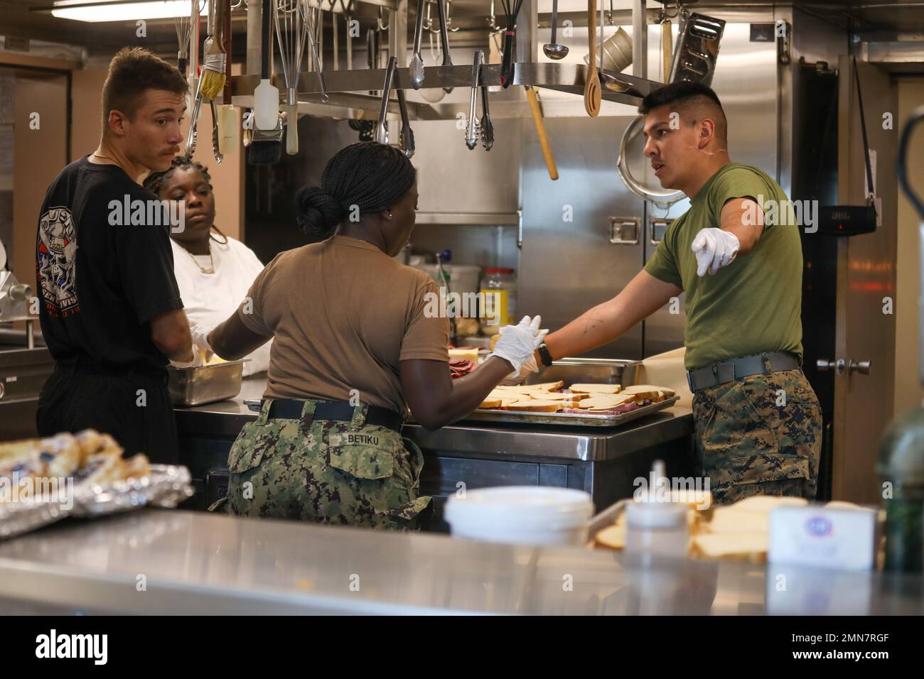 U.S. Marine Corps Lance Cpl. Niko Martinez, a food service specialist ...