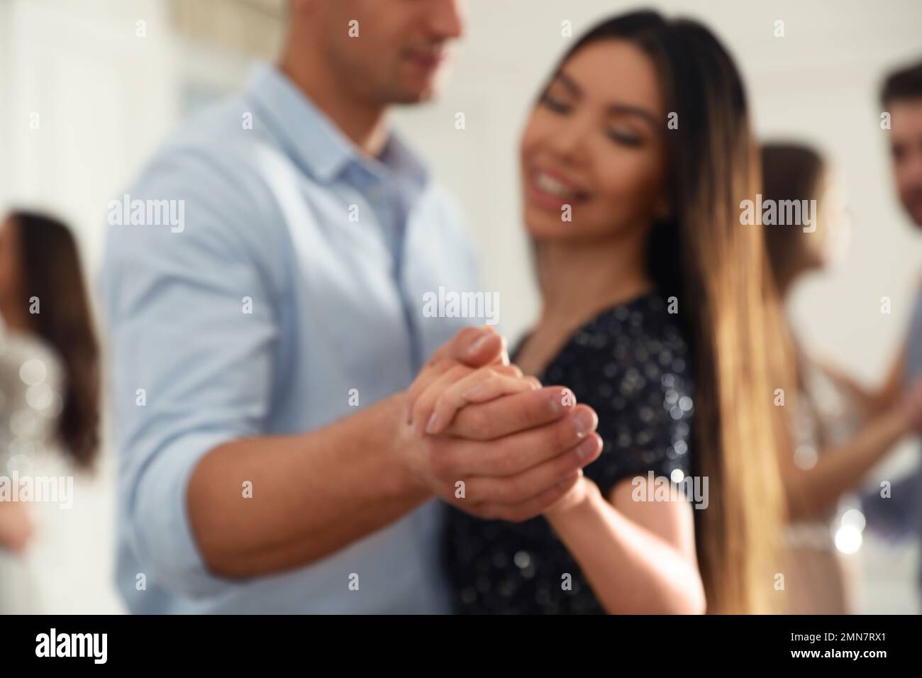 Couple dancing at party hi-res stock photography and images - Alamy
