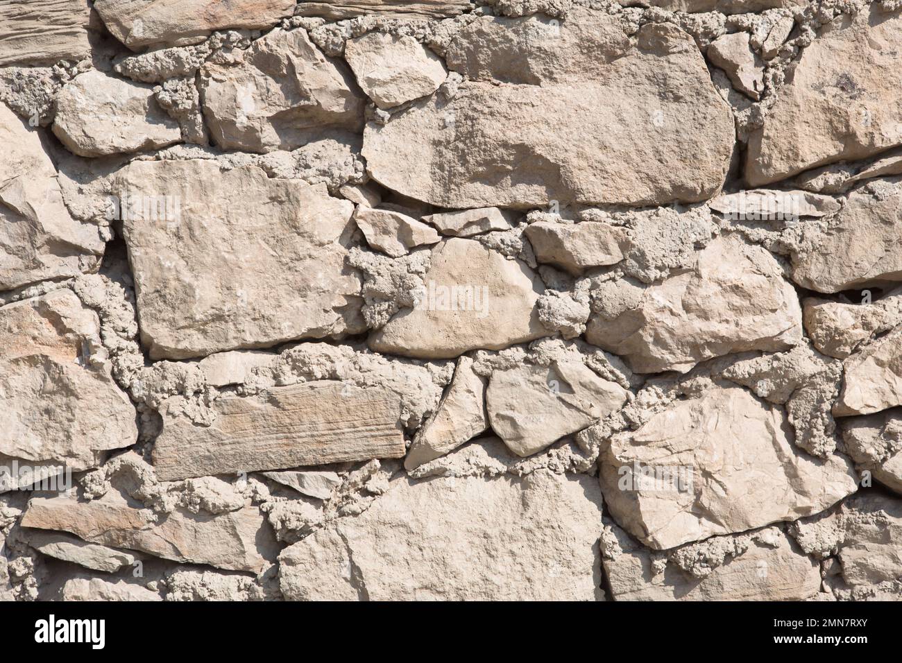 Masonry walls of natural sand color. Stone texture close-up ...