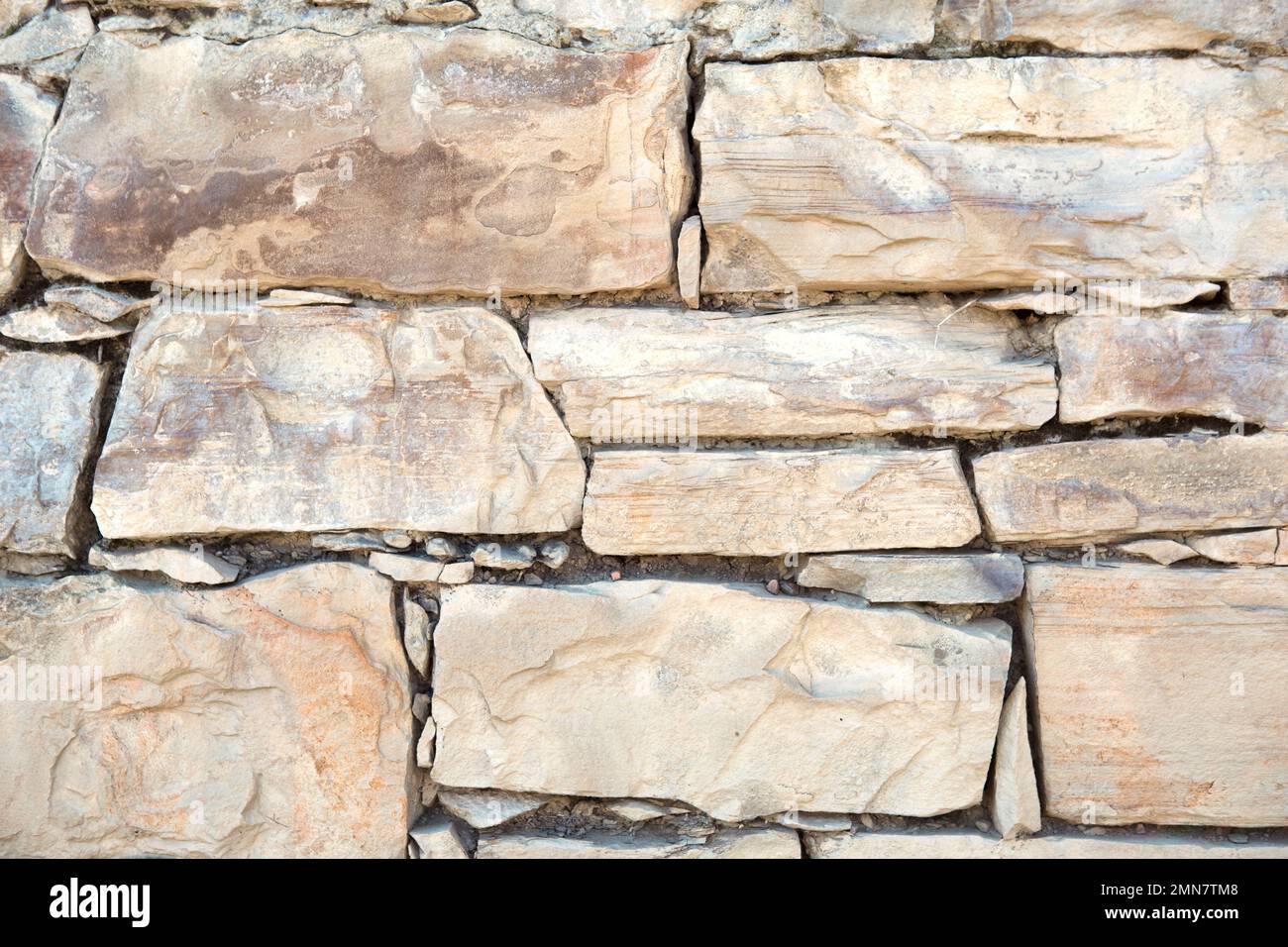 Masonry walls of natural sand color. Stone texture close-up ...