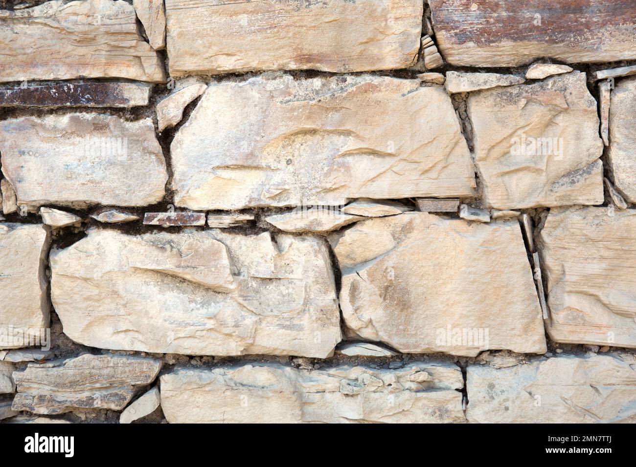 Masonry walls of natural sand color. Stone texture close-up ...