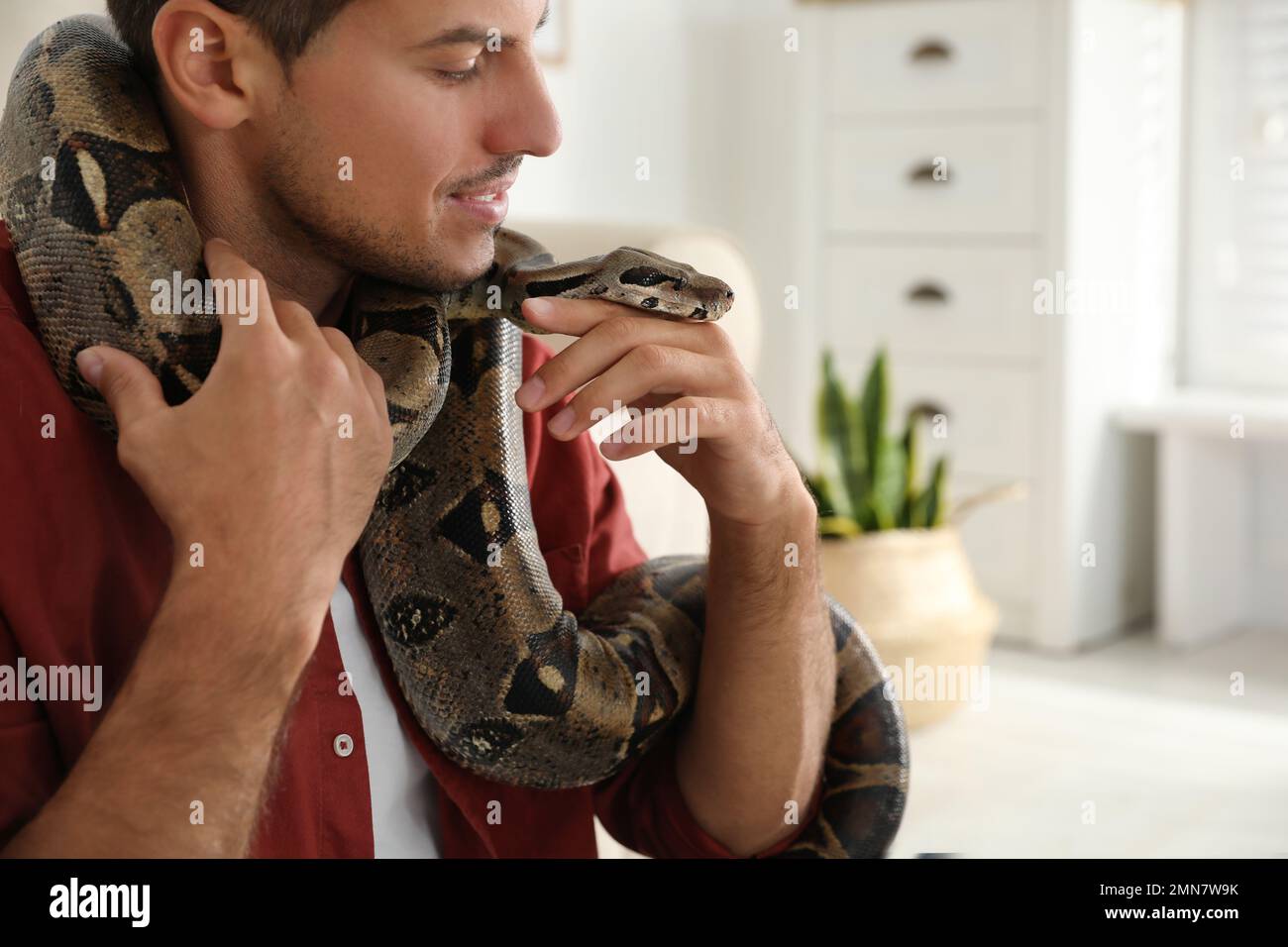 Person snake skin hi-res stock photography and images - Alamy