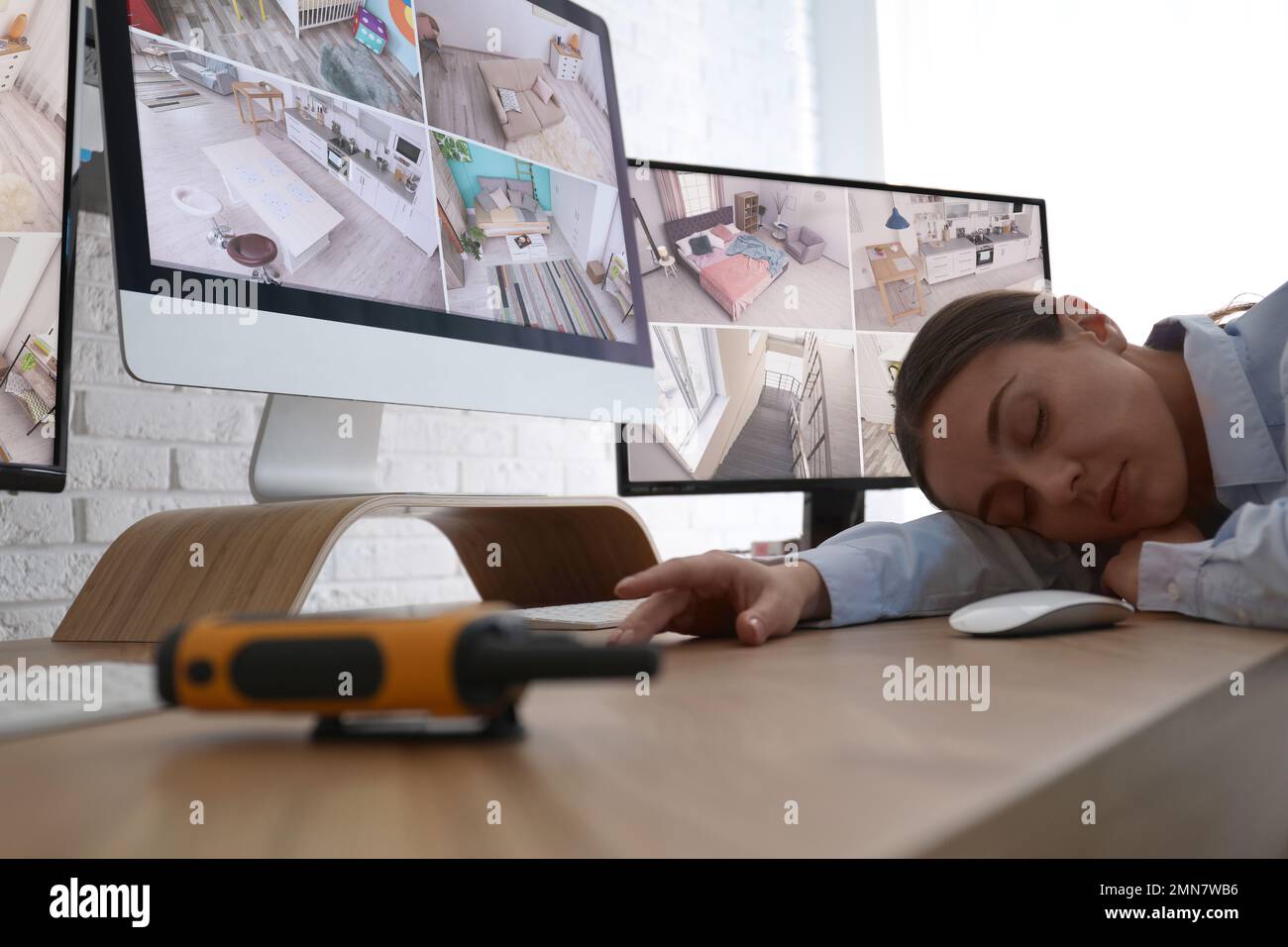 Female security guard sleeping near monitors at workplace Stock Photo ...