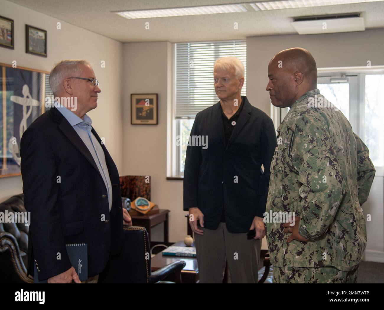 David Adams, Commander, Fleet Activities Sasebo, speaks with Dr ...