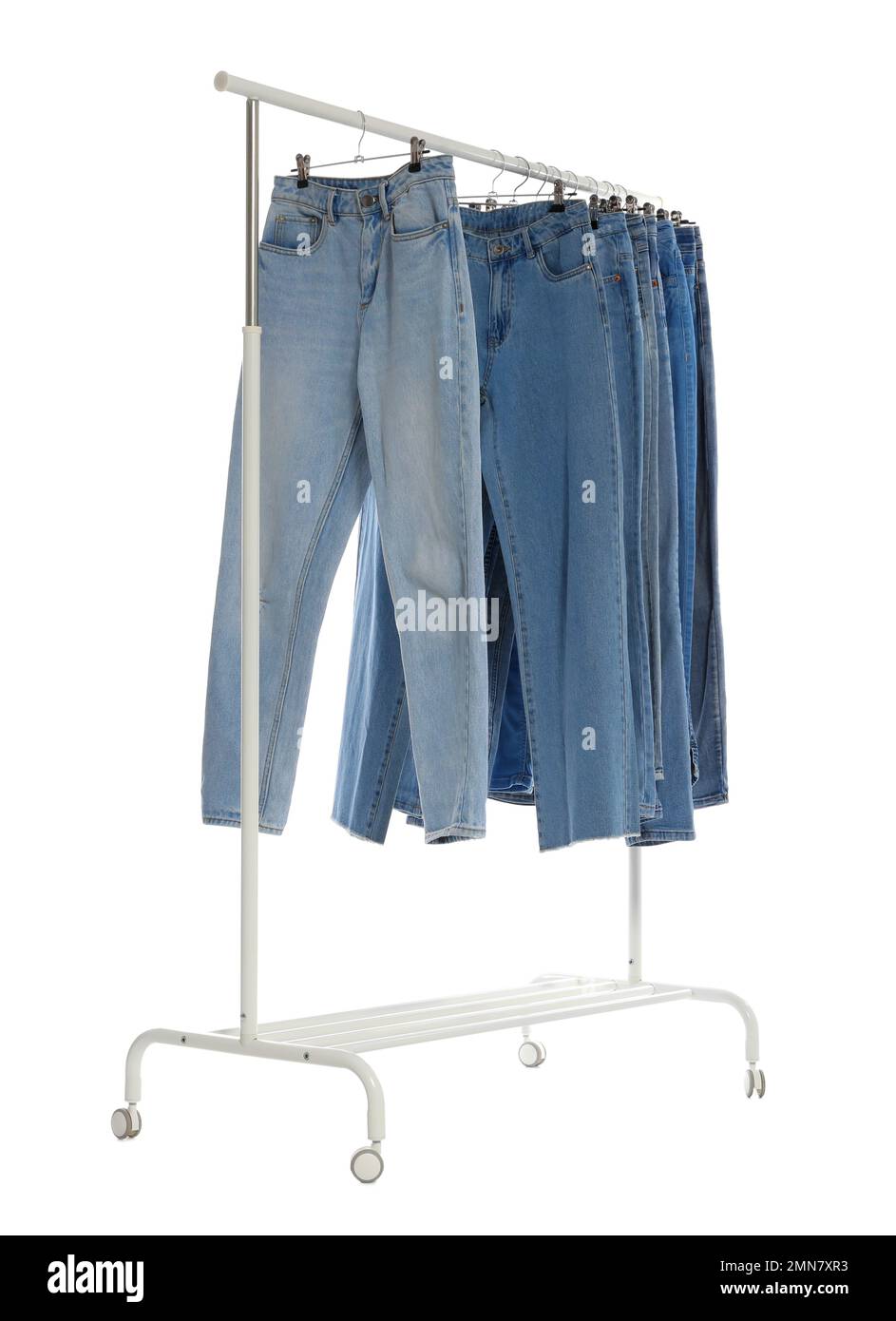 Jeans hanging wardrobe Cut Out Stock Images & Pictures - Alamy