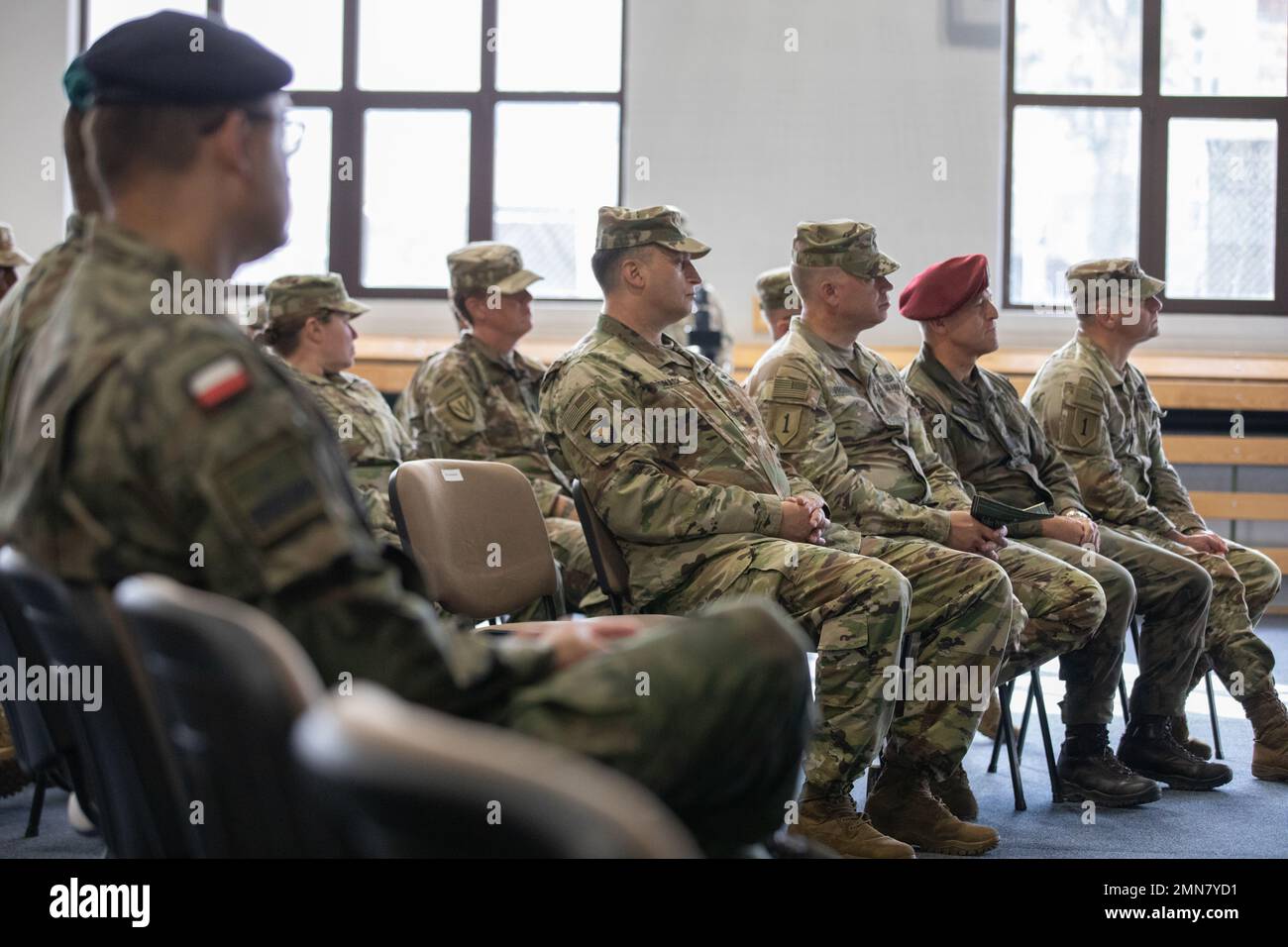 U.S. Army Maj. Gen. David B. Woman, center, deputy commanding general ...