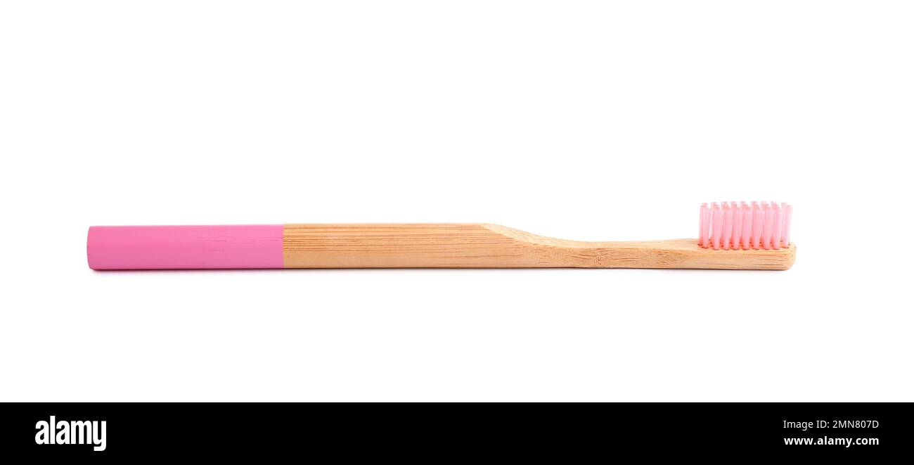 Bamboo toothbrush with pink bristle isolated on white Stock Photo - Alamy