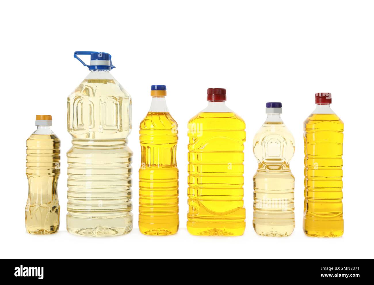 Cooking oil in different bottles isolated on white Stock Photo - Alamy