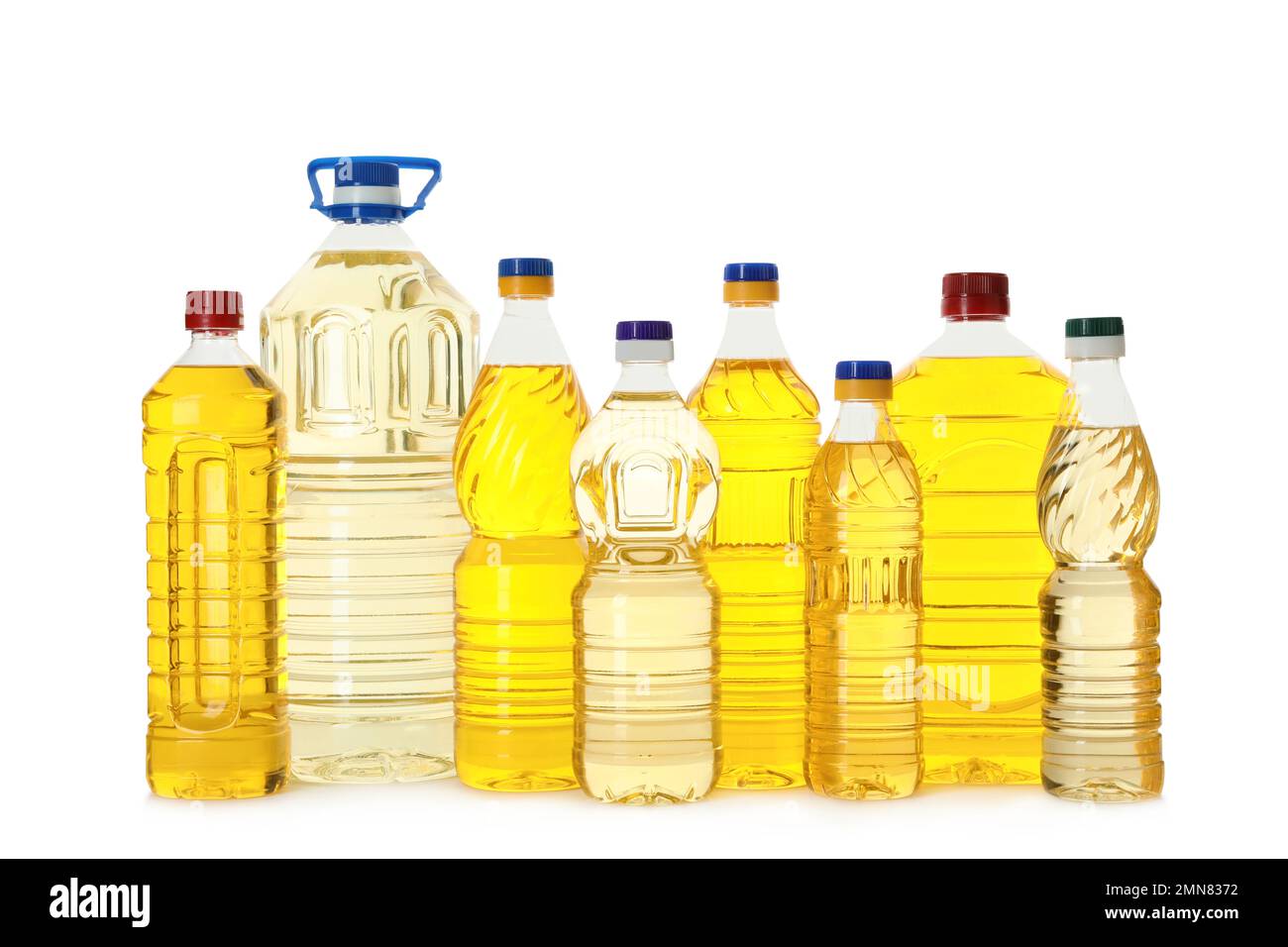 Cooking oil in different bottles isolated on white Stock Photo - Alamy
