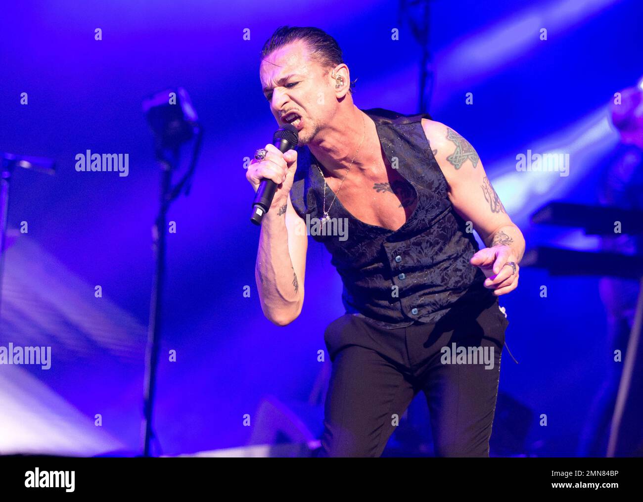 Dave Gahan of the band Depeche Mode performs in concert during their ...