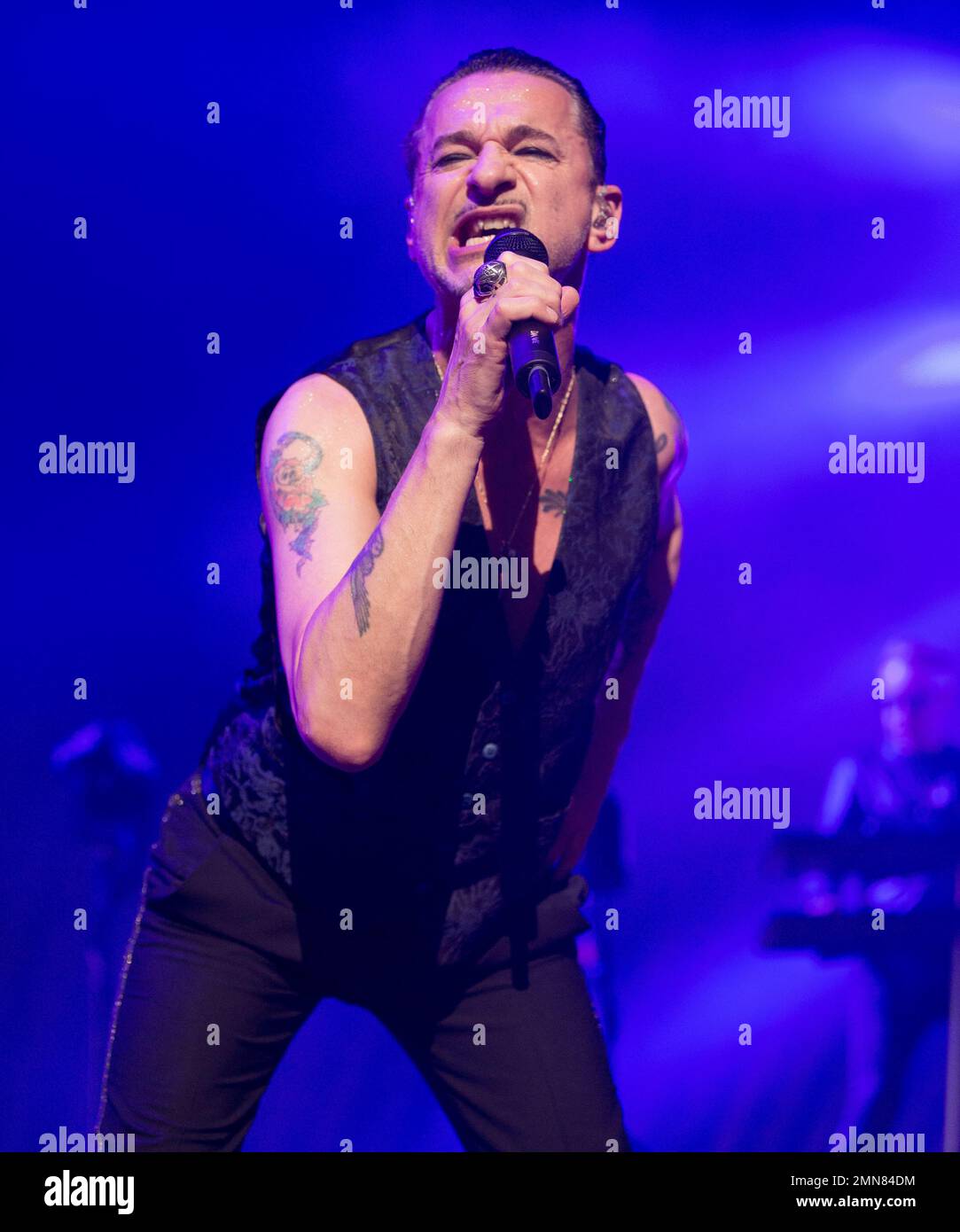 Dave Gahan of the band Depeche Mode performs in concert during their ...
