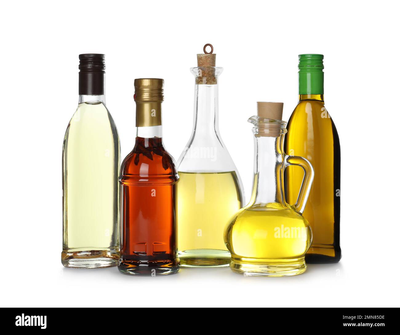 Different sorts of cooking oil in bottles isolated on white Stock Photo ...
