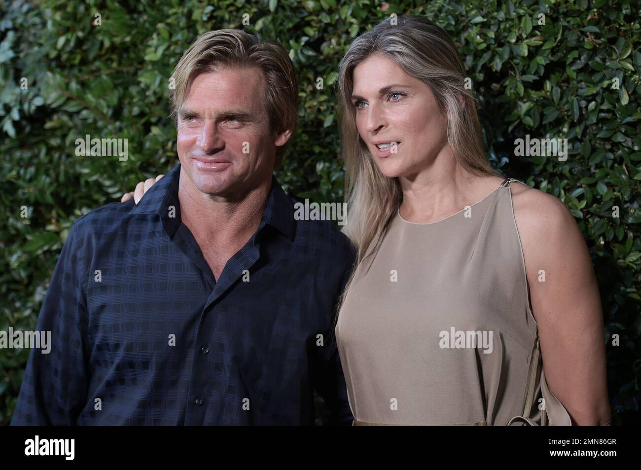 Laird Hamilton, left, and Gabrielle Reece attend Chanel and NRDC Host ...