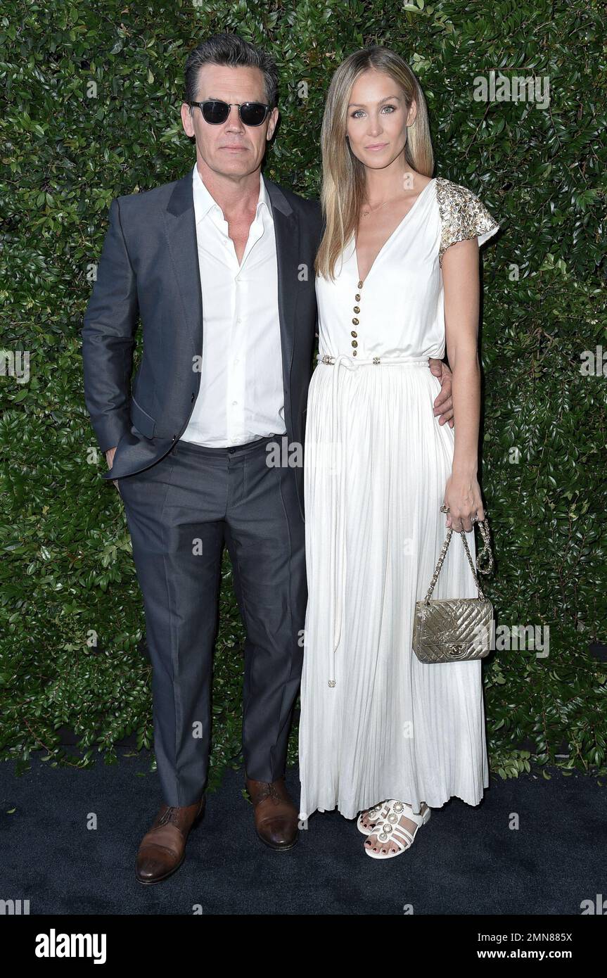 Josh Brolin, left, and Kathryn Boyd attend Chanel and NRDC Host Dinner ...