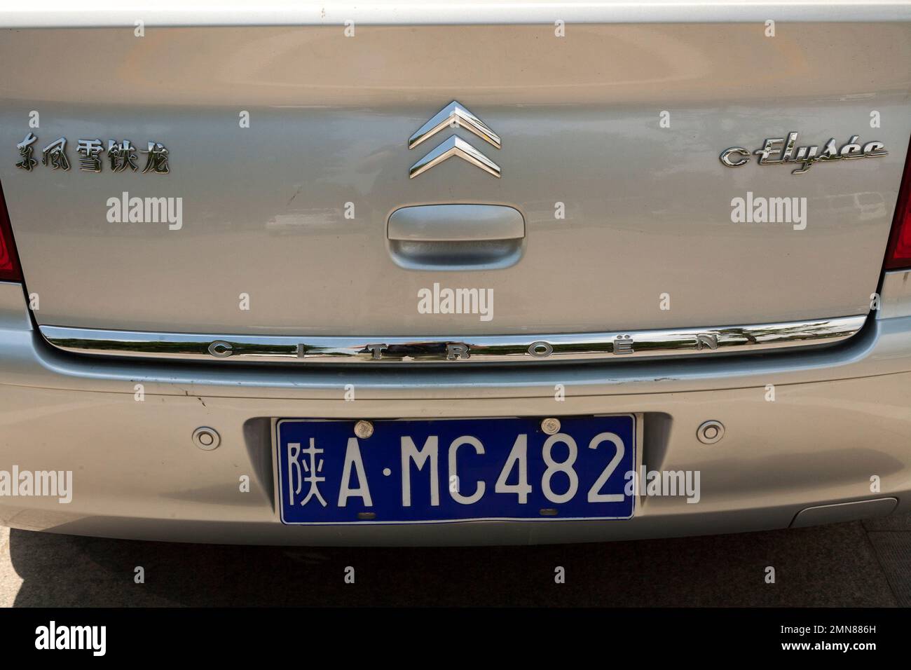 Rear with numberplate and model written in Chinese characters / writing ...