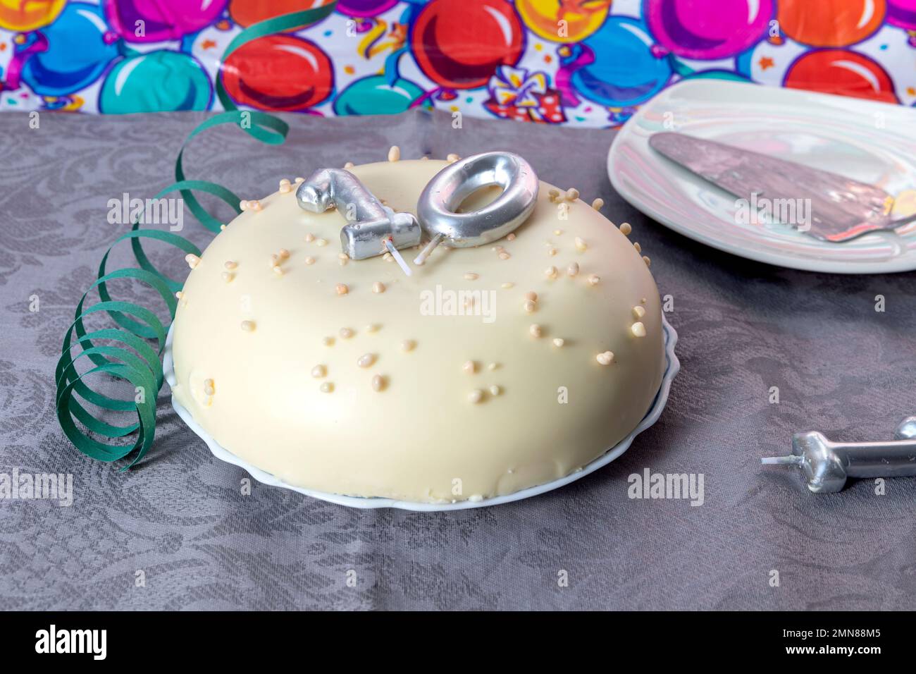 White chocolate cake for birthday with number candles and background ...