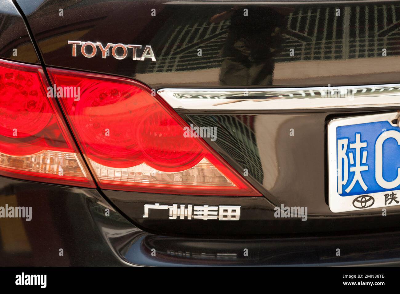 Rear with numberplate and model written in Chinese characters / writing ...