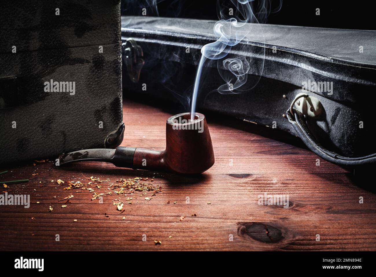 Sheaths of musical instruments and pipe smoking Stock Photo - Alamy