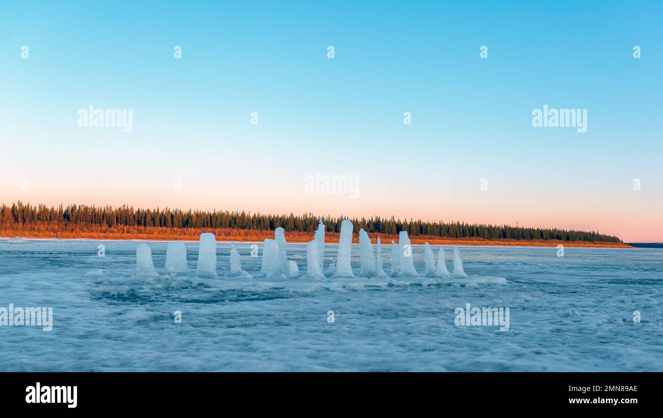 The remains of pillars of ice carved for drinking water melt standing ...
