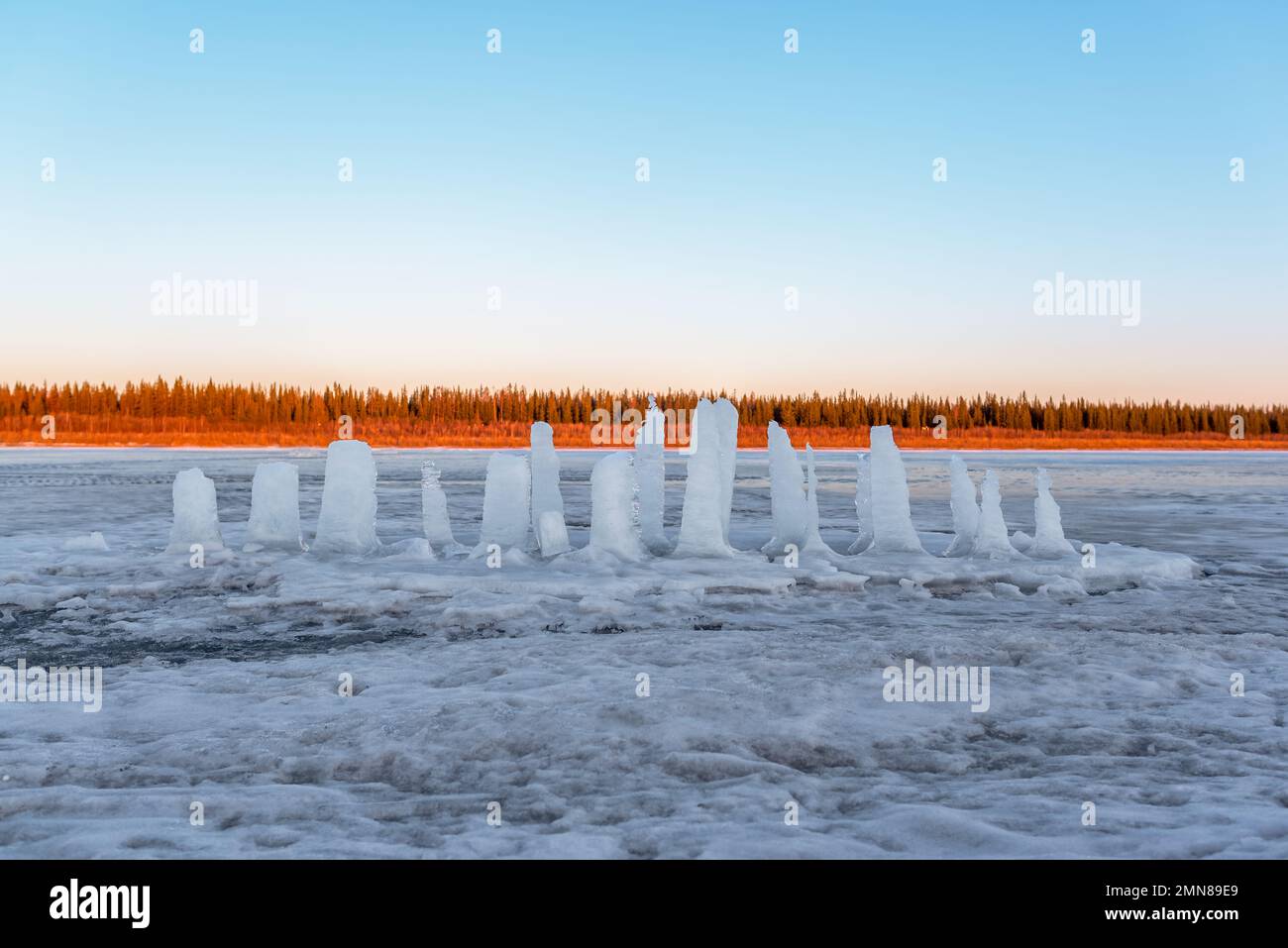 The remains of pillars of ice cut for drinking water melt standing on ...