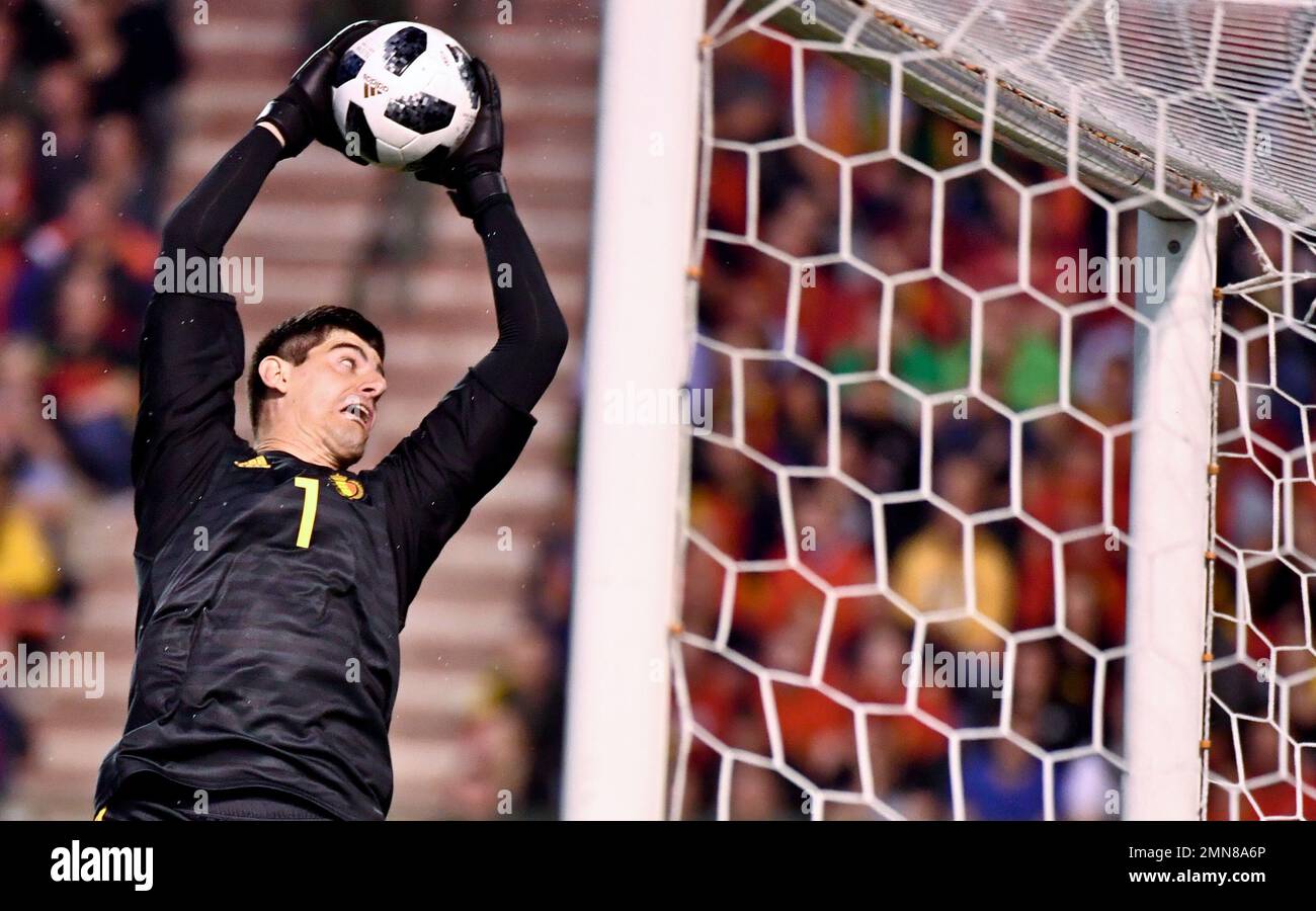 Belgium's goalkeeper Thibaut Courtois saves a shot on goal during a ...
