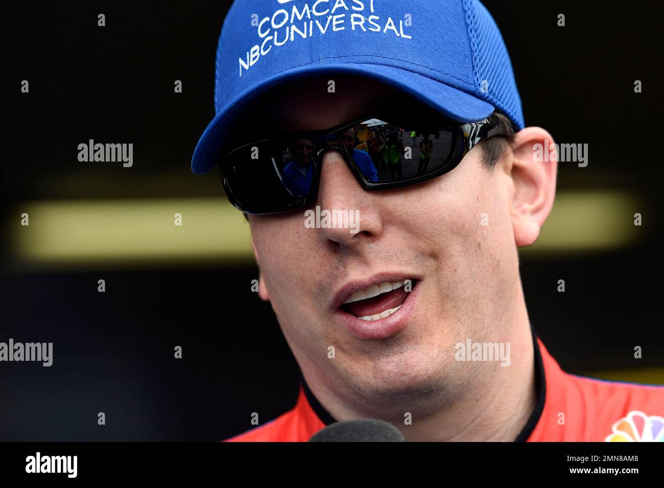 Kyle Busch answers questions in an interview during practice for Sunday ...