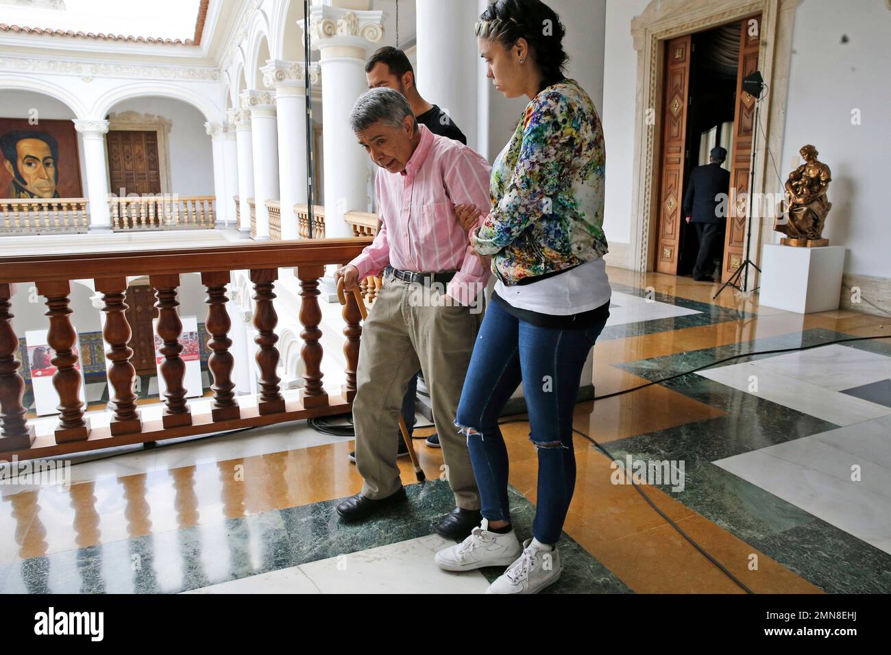 Venezuelan Army Gen. Angel Vivas is helped by Foreign Ministry officers ...