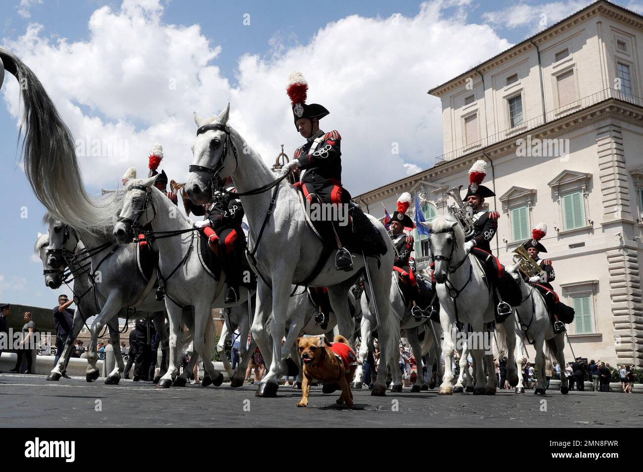 Horse-mounted Carabinieri officers perform the changing of the guard ...
