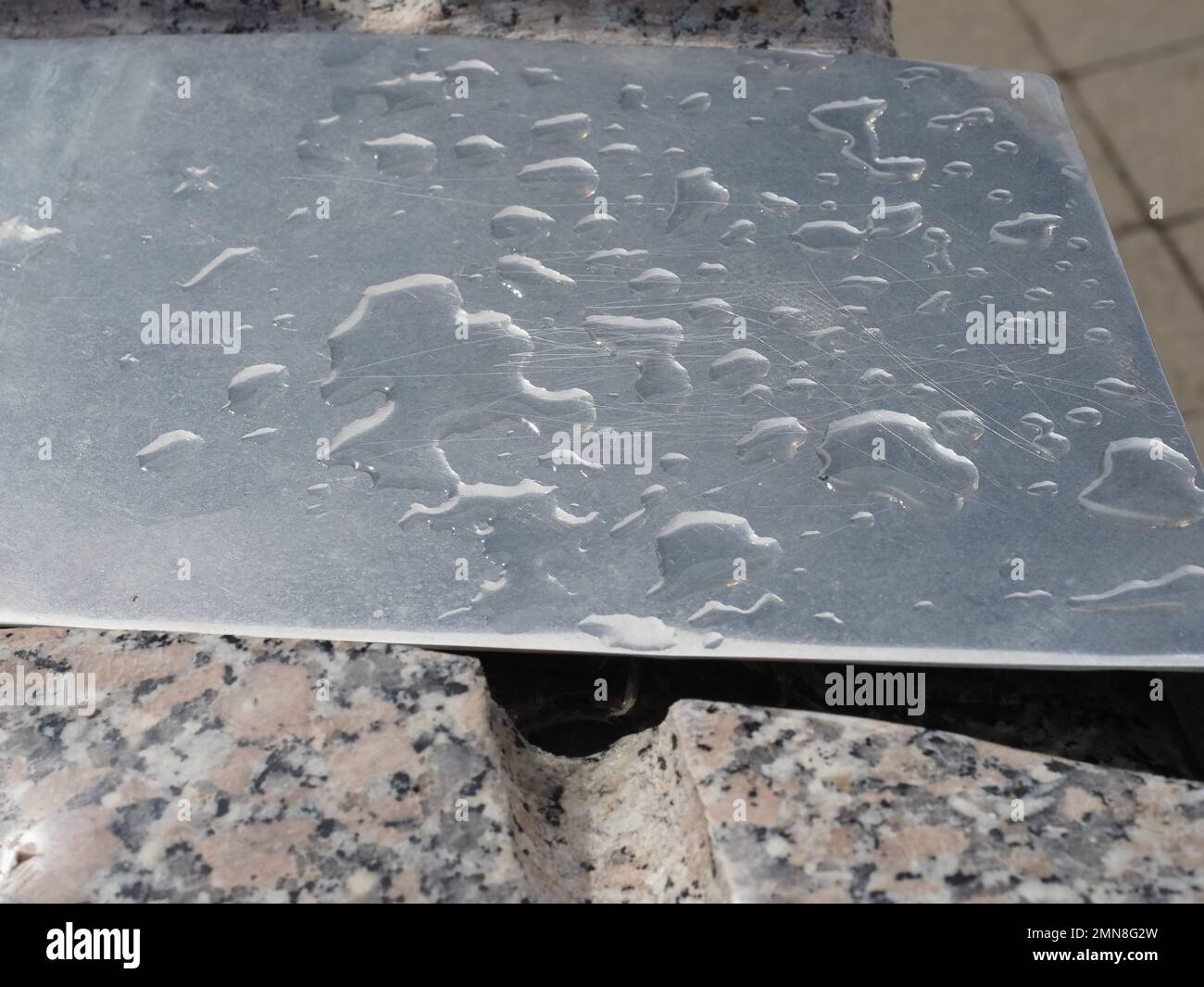 droplets of rain on a steel surface Stock Photo - Alamy