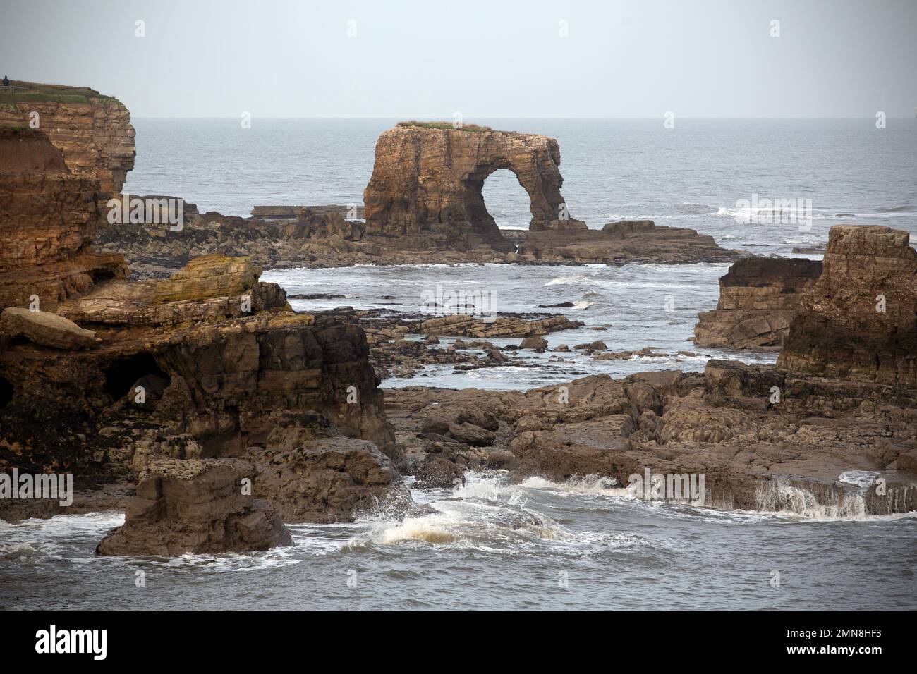 Rock formations in the sea near Souter Lighthouse. The Pub Walk in ...