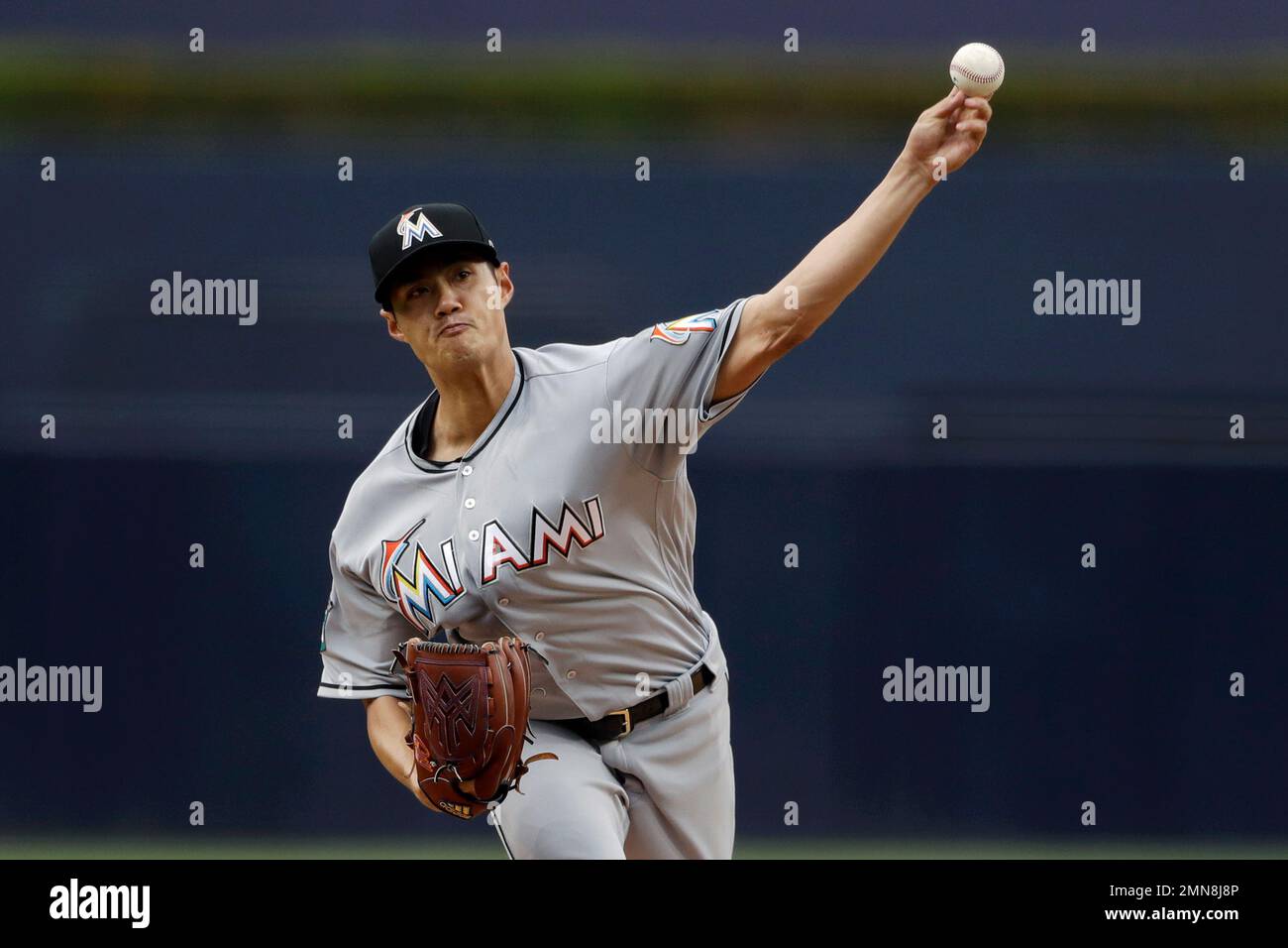 Miami Marlins starting pitcher Wei-Yin Chen throws to a San Diego ...