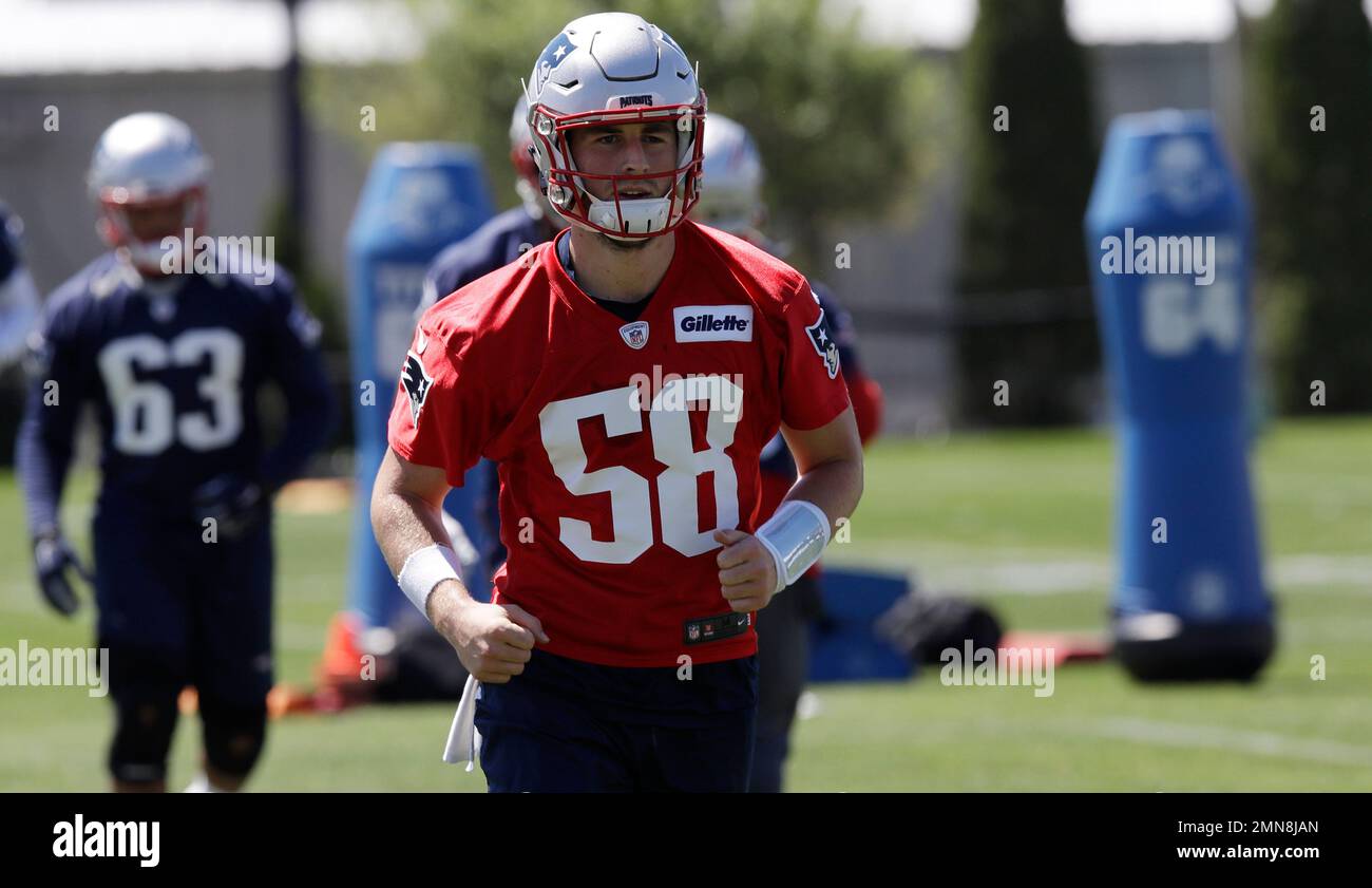 New England Patriots quarterback Danny Etling runs during practice at ...