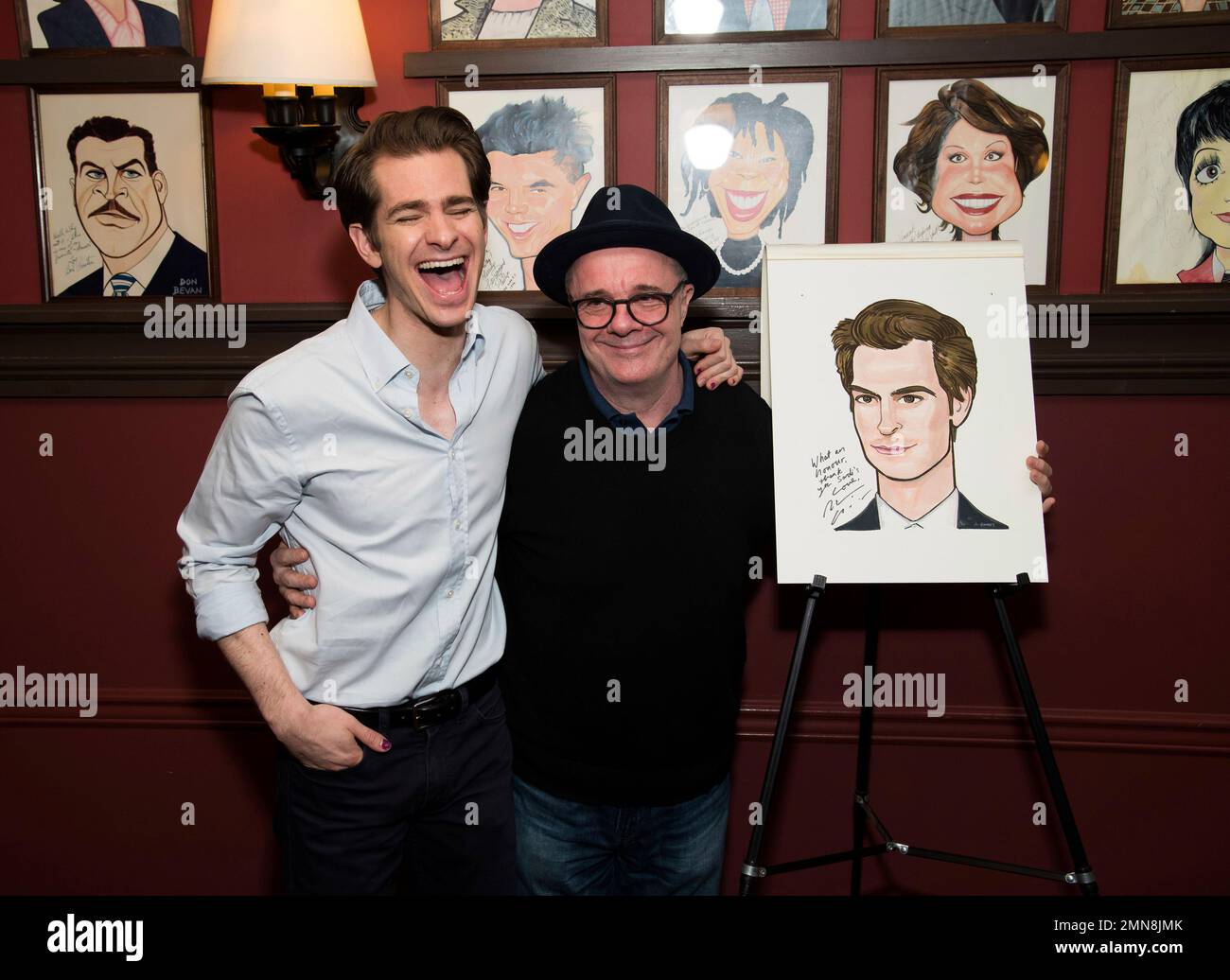 Andrew Garfield, left, and Nathan Lane attend Garfield's caricature ...