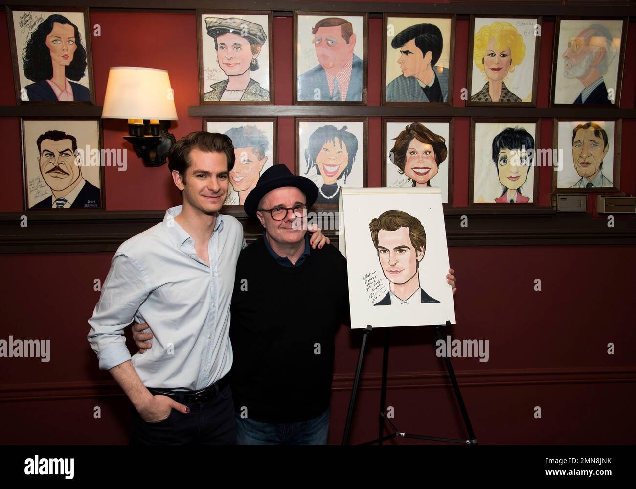 Andrew Garfield, left, and Nathan Lane attend Garfield's caricature ...