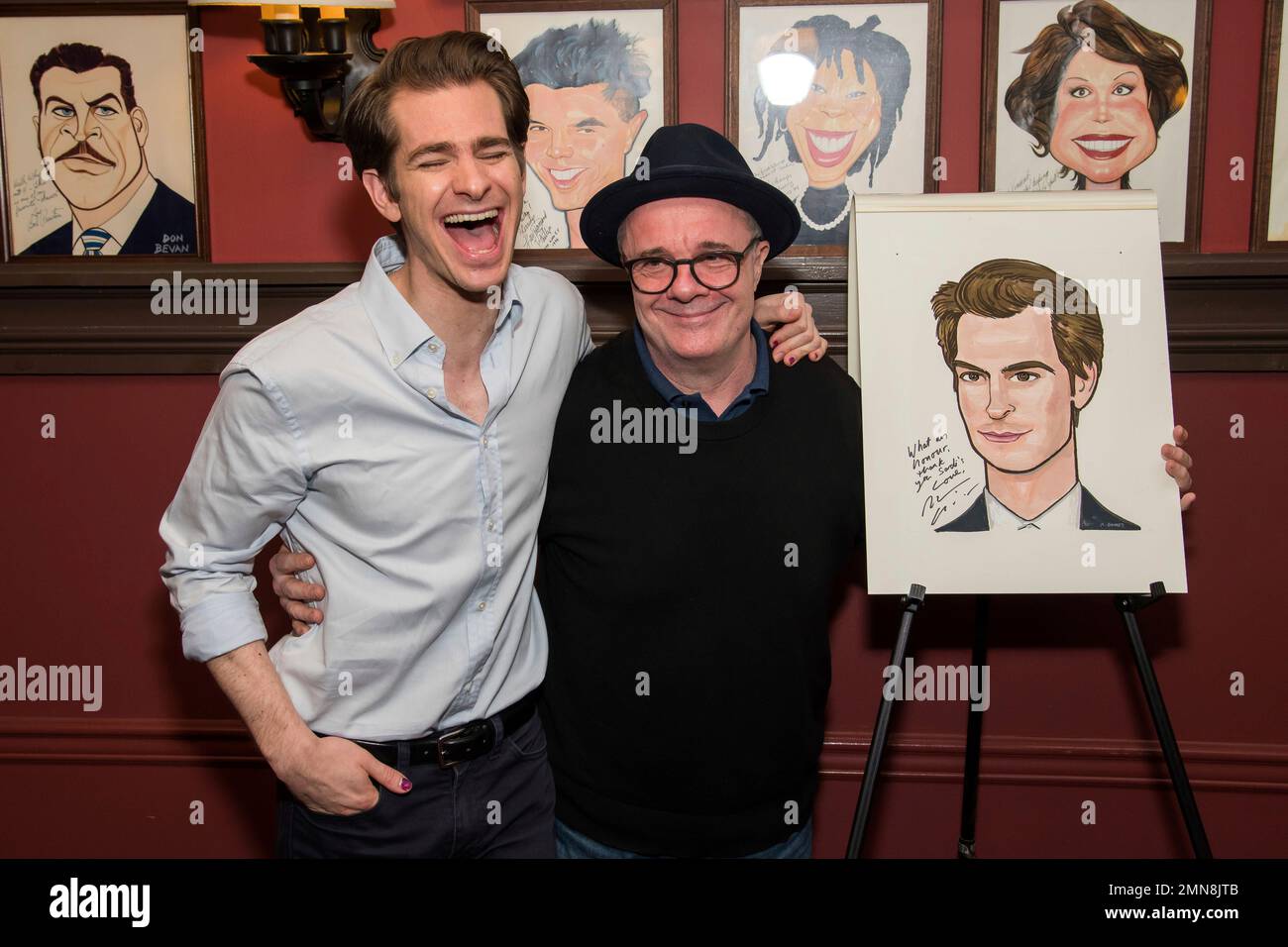 Andrew Garfield, left, and Nathan Lane attend Garfield's caricature ...