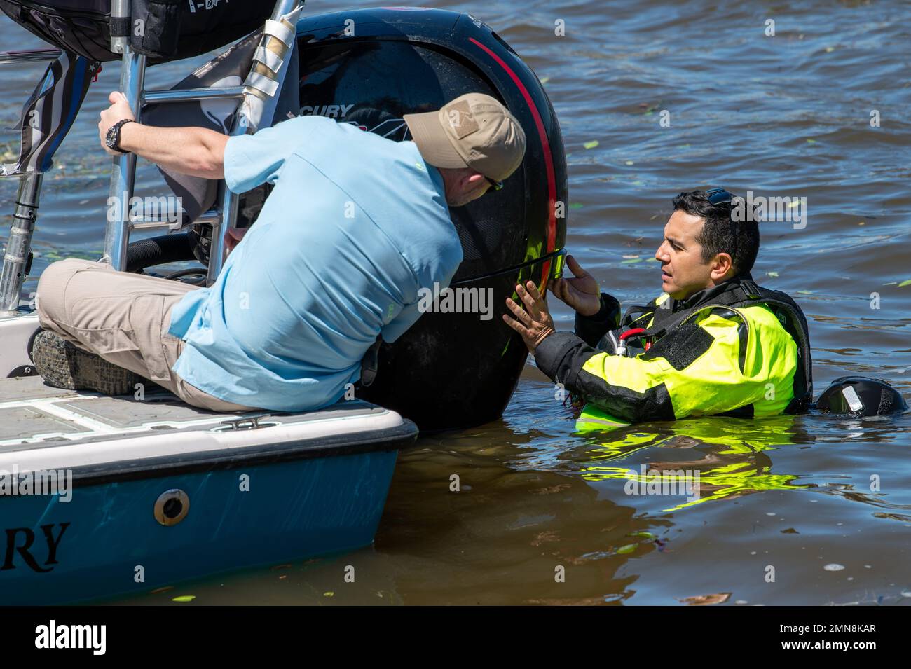 Petty Officer 1st Class Mark Torres, Pacific Strike Team, during search ...