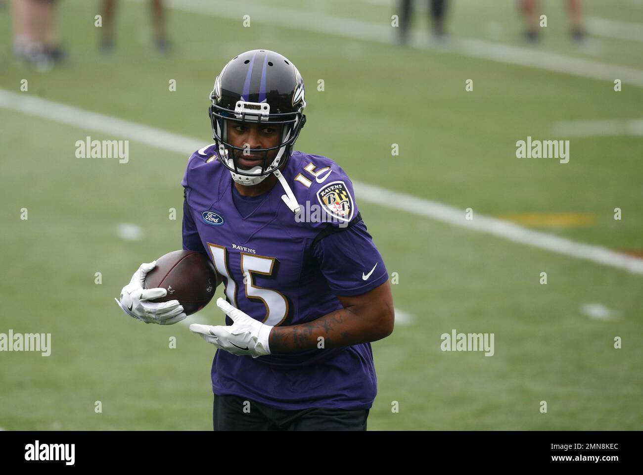 Baltimore Ravens wide receiver Michael Crabtree runs a drill during an ...
