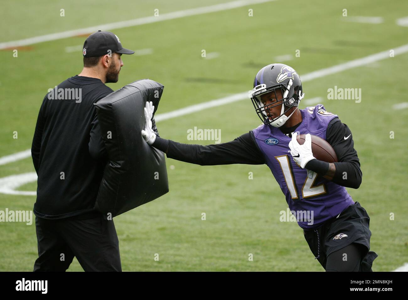 Baltimore Ravens wide receiver Jaleel Scott, right, runs a drill during ...