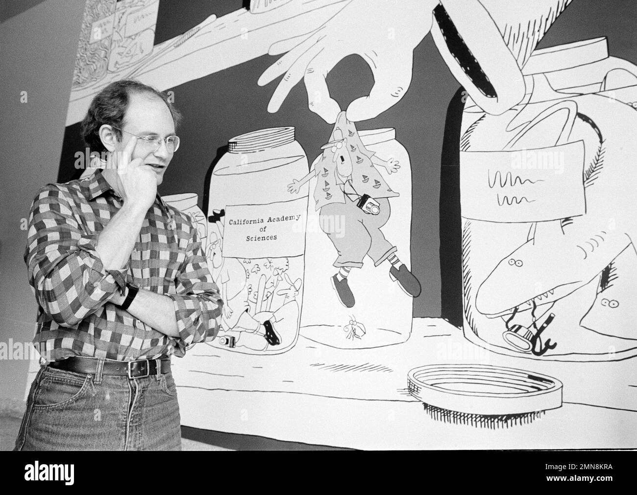Cartoonist Gary Larson, 35, of Seattle, poses beside some of his "Far ...