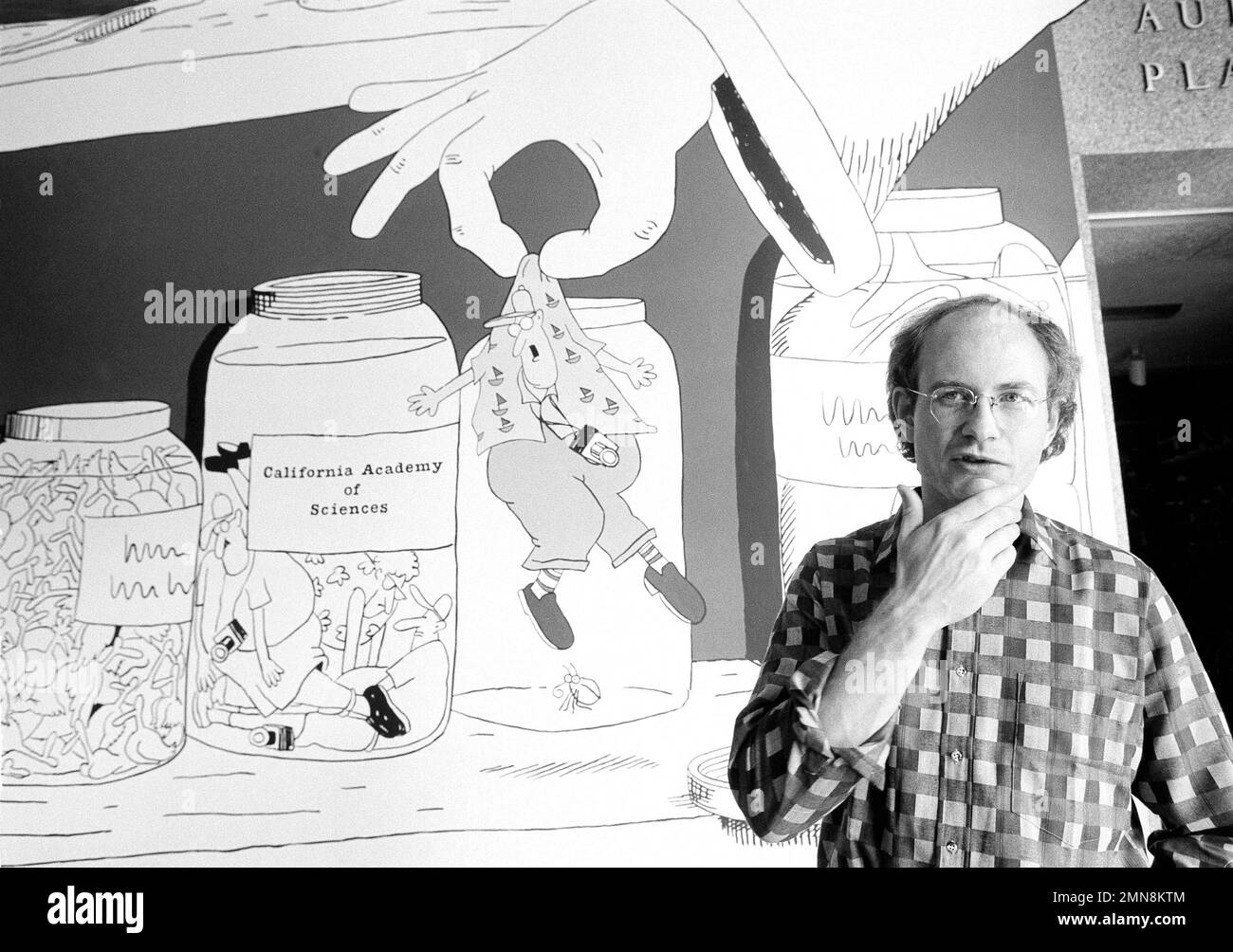 Cartoonist Gary Larson, 35, of Seattle, poses beside some of his "Far ...