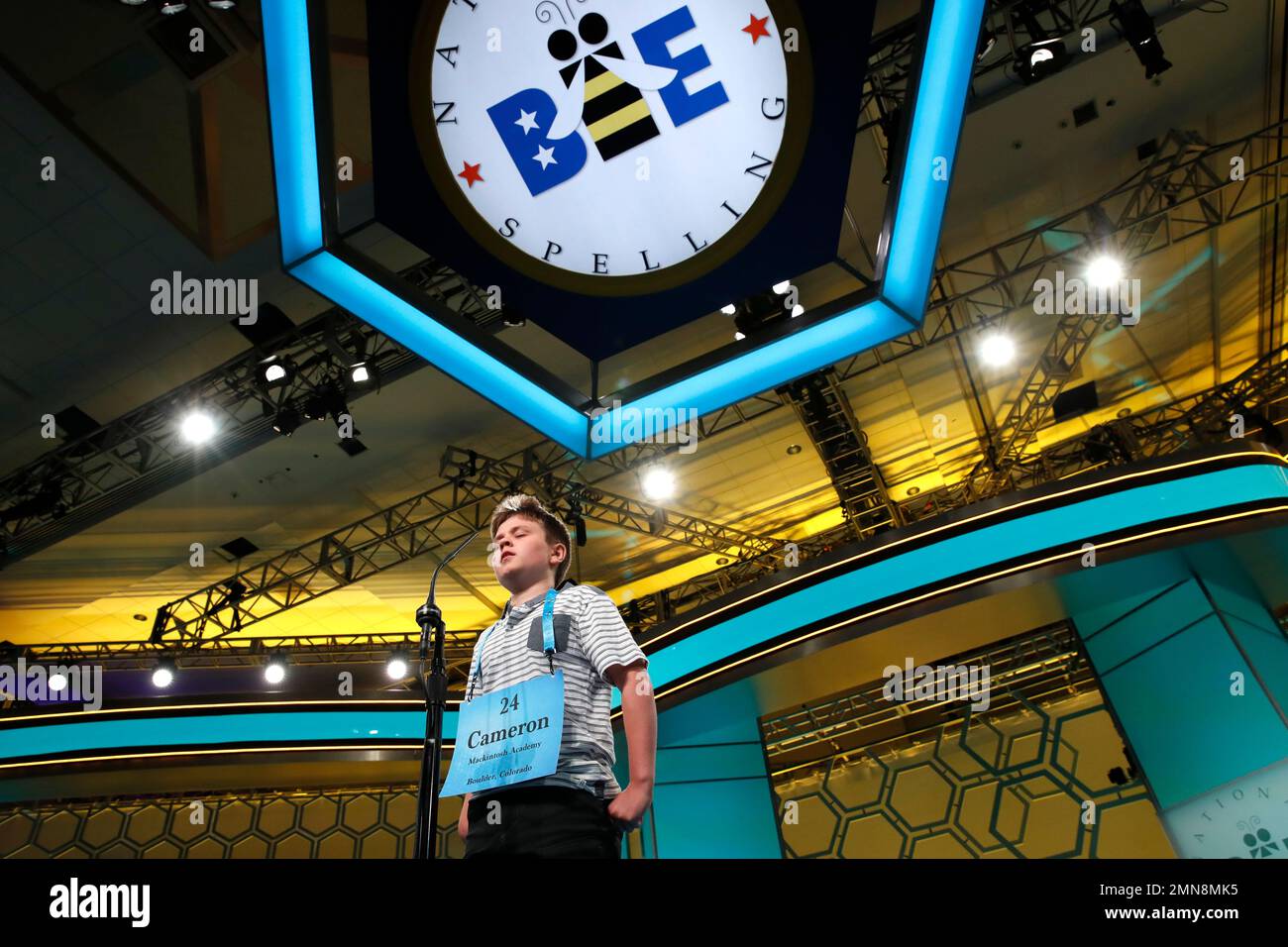 Cameron Keith, 12, from Boulder, Colo., concentrates on spelling his ...