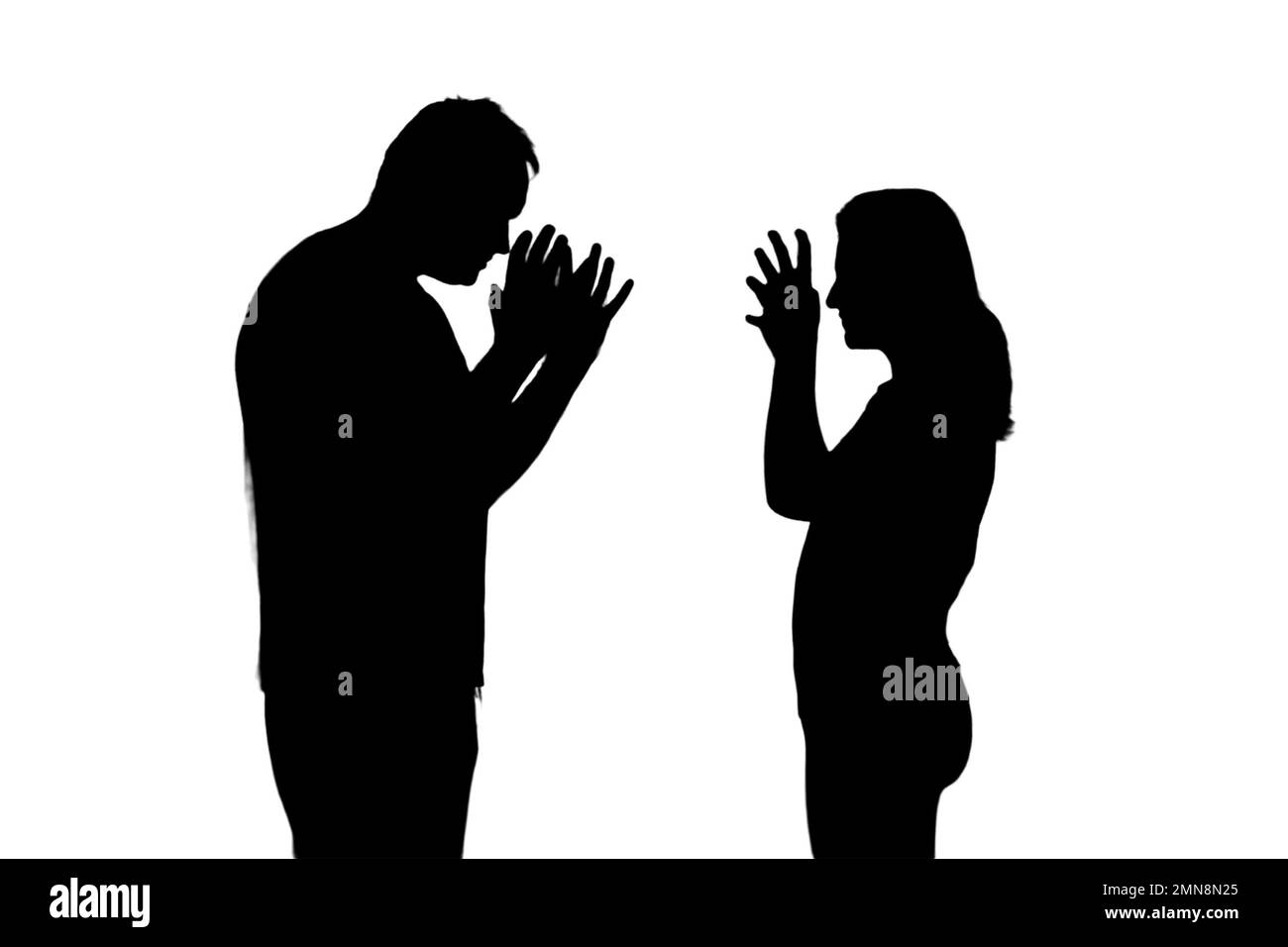 Silhouette of quarreling man and woman, isolated on a white background ...