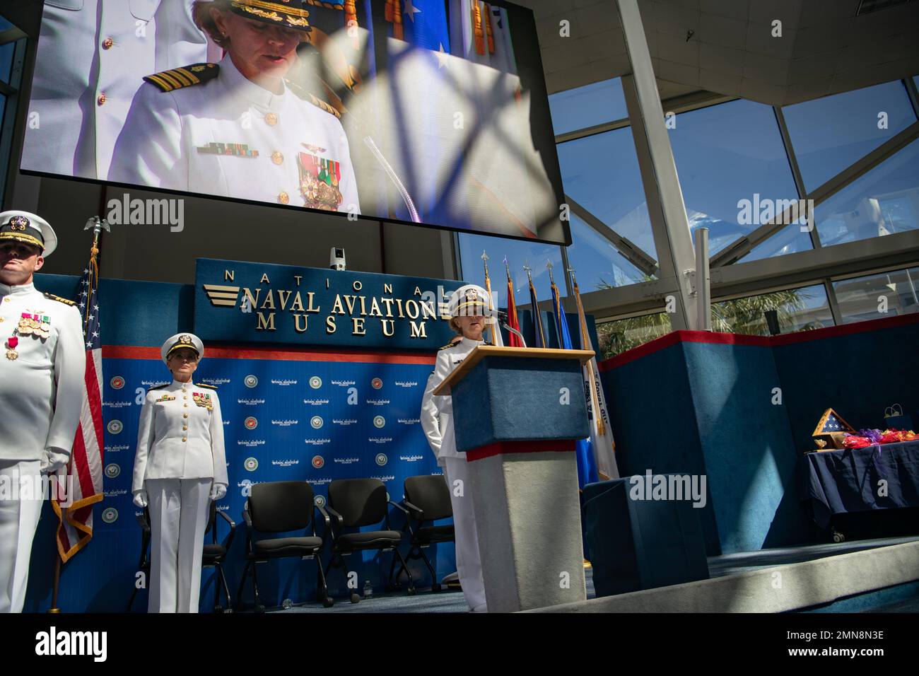 Capt. Kimberly P. Toone reads her orders as she assumes command during ...