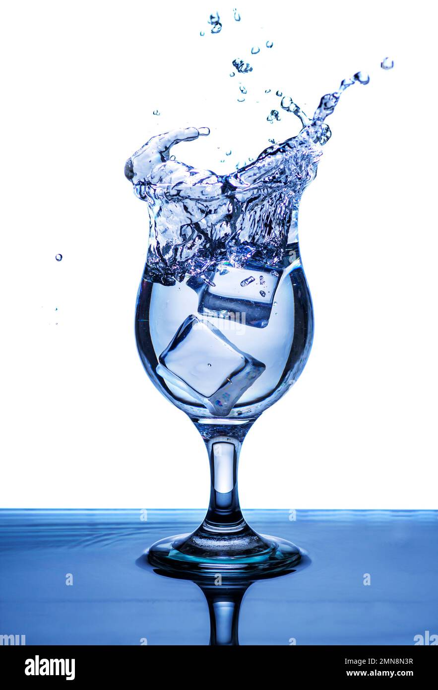 The image of pouring drinking water, into a broken glass, that makes ...