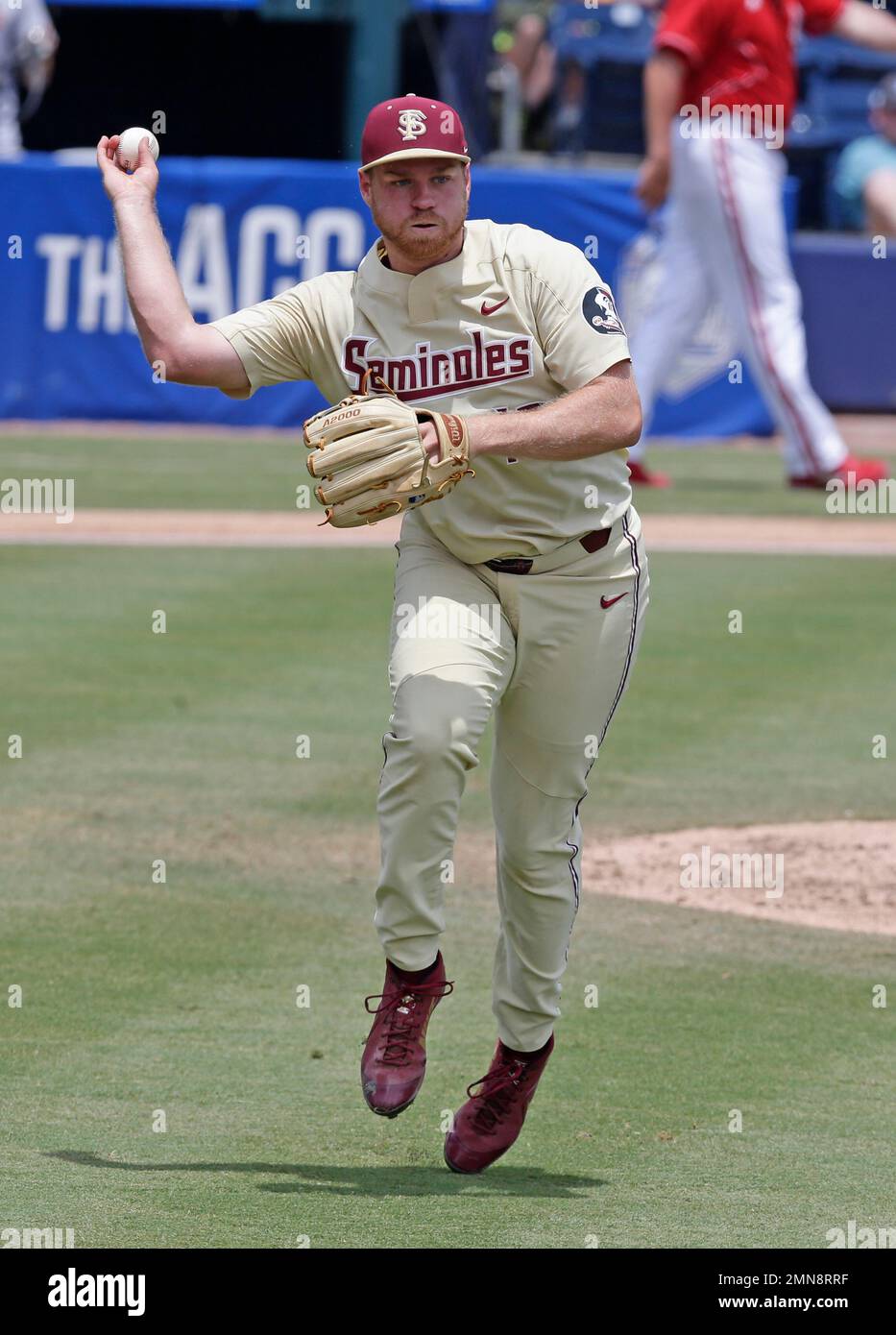 Florida State pitcher Andrew Karp makes a play at first base during an ...