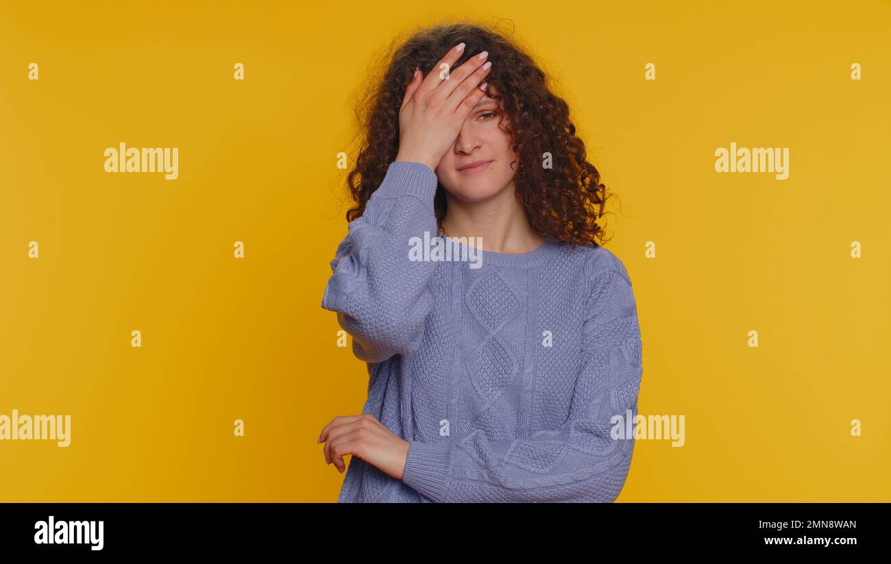 Face palm. Shame on you. Upset curly haired woman making face palm ...