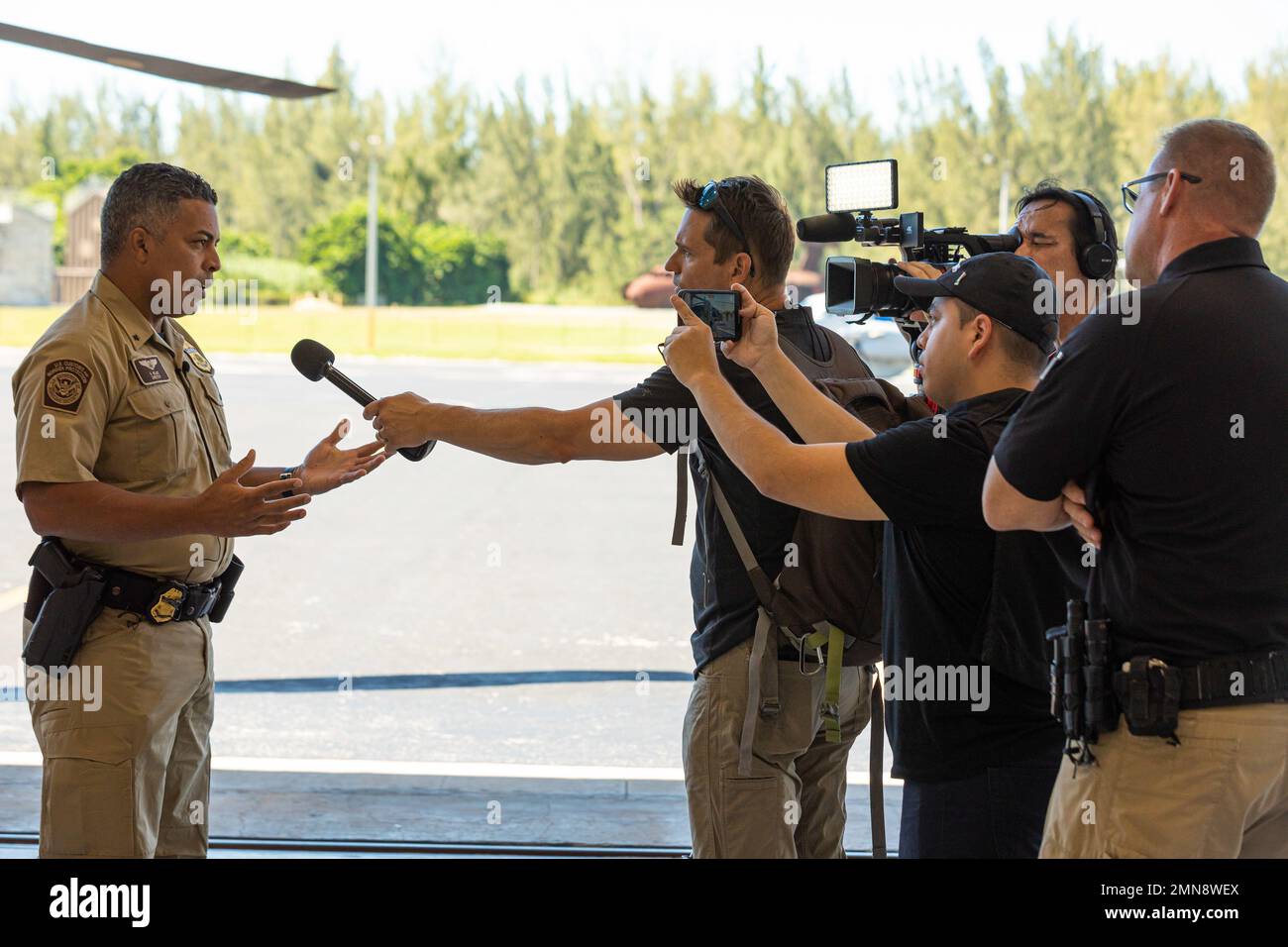 Miami Air and Marine Branch Director Hector Rojas conducts interviews ...