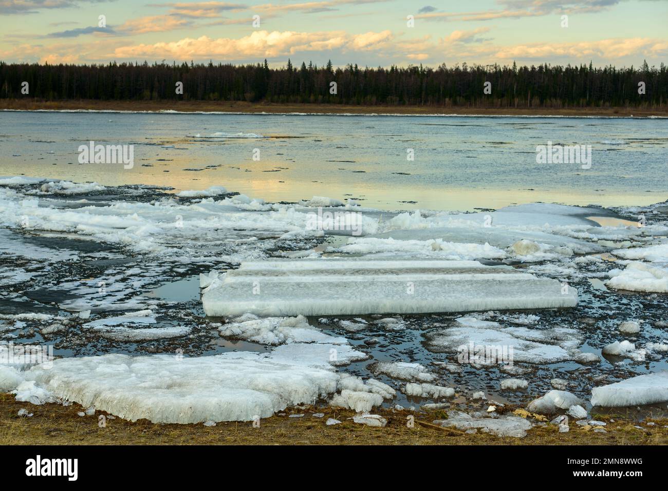 The remains of the last spring ice on the Vilyui River in Yakutia are ...