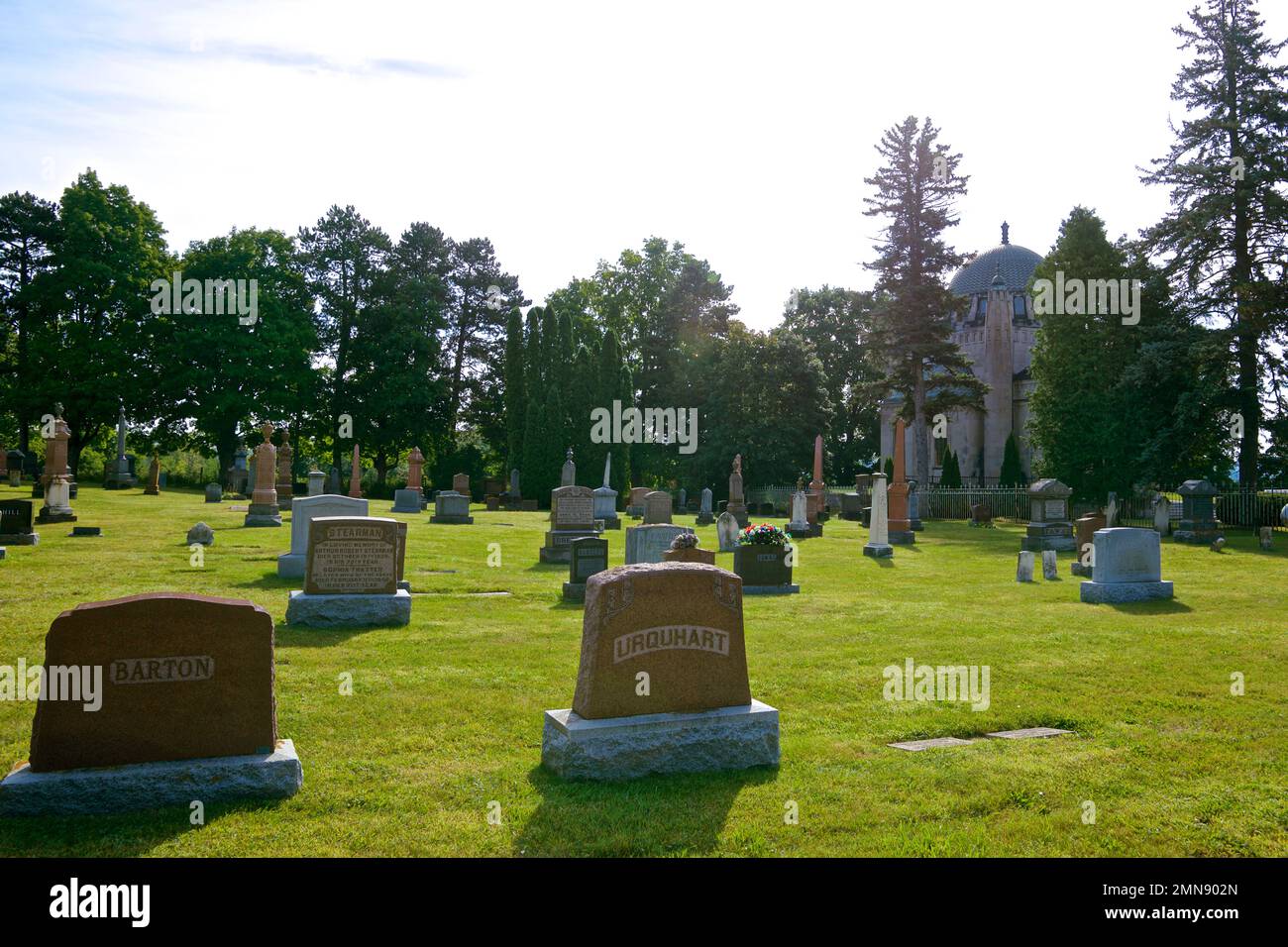 Tombstones and graves in a church graveyard Stock Photo - Alamy